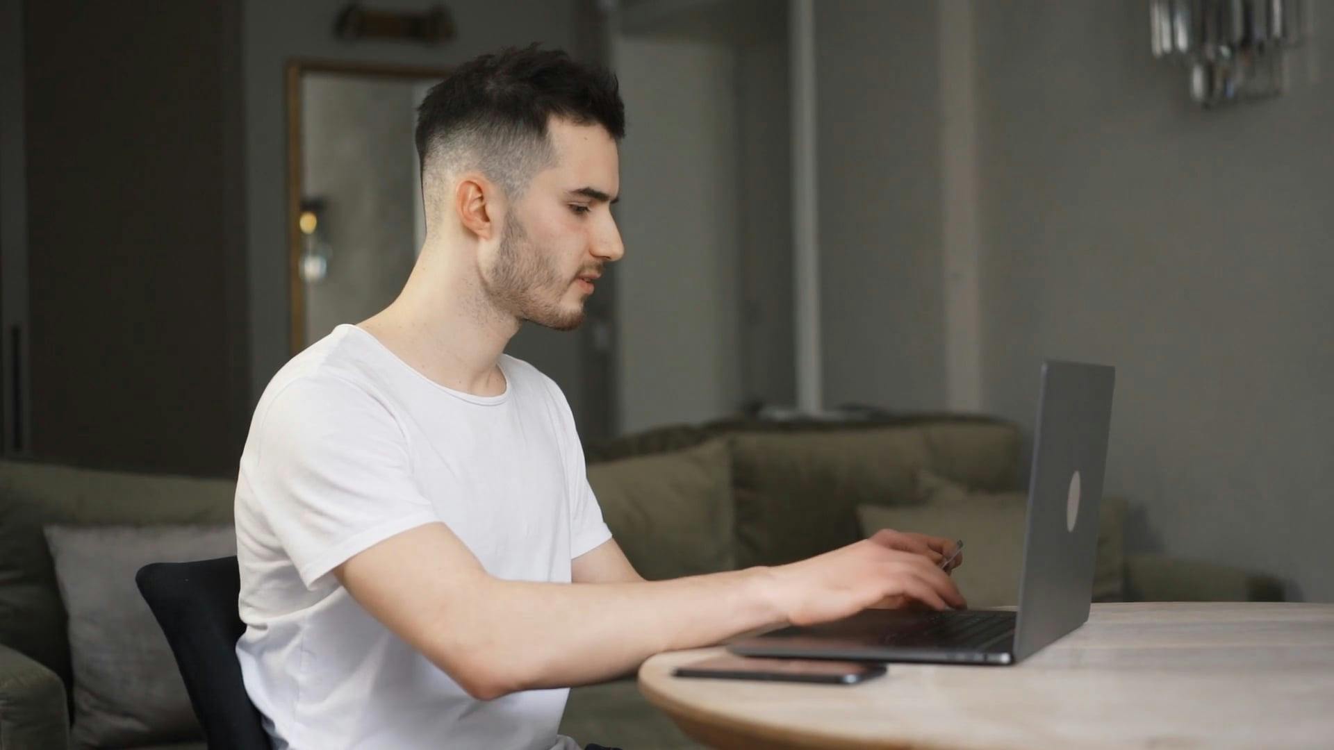 A Man Making an Online Purchase on a Laptop Free Stock Video Footage ...