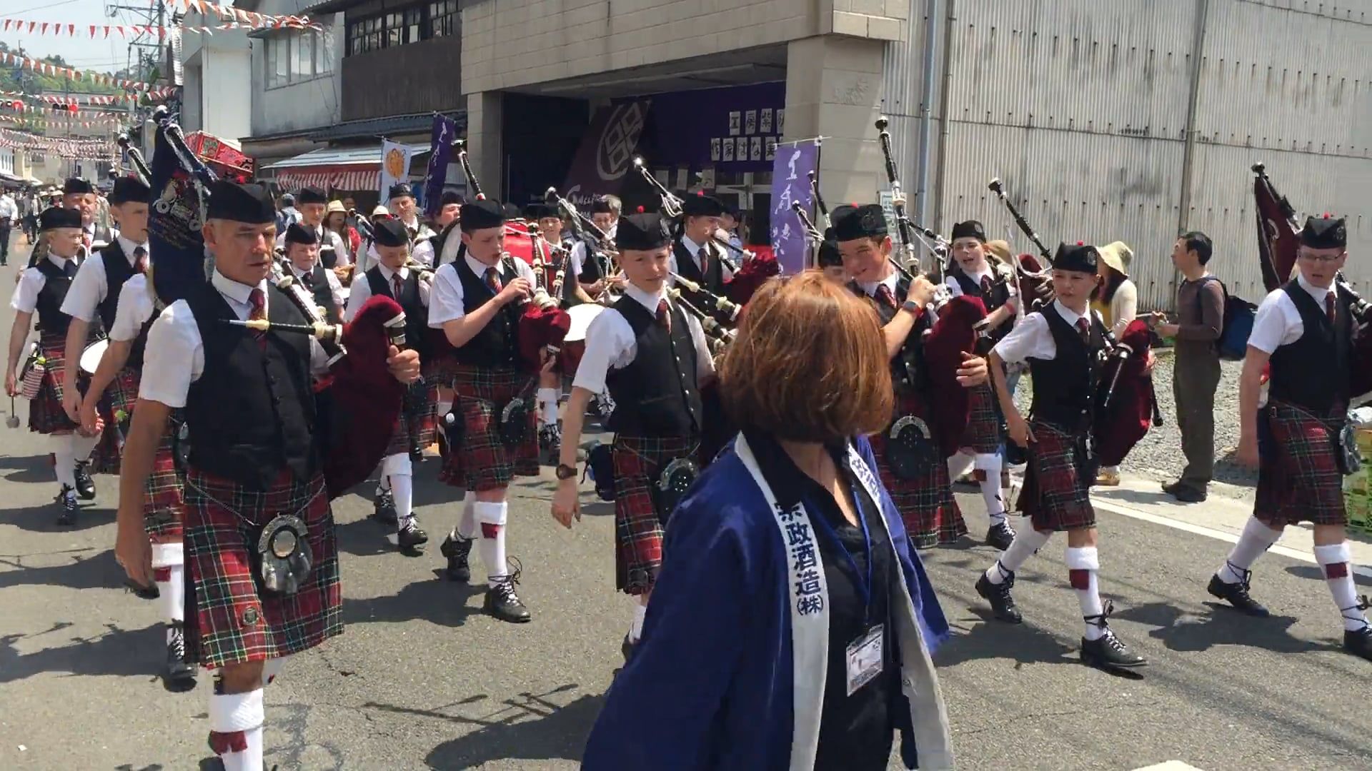 Band Marching in the Street · Free Stock Video
