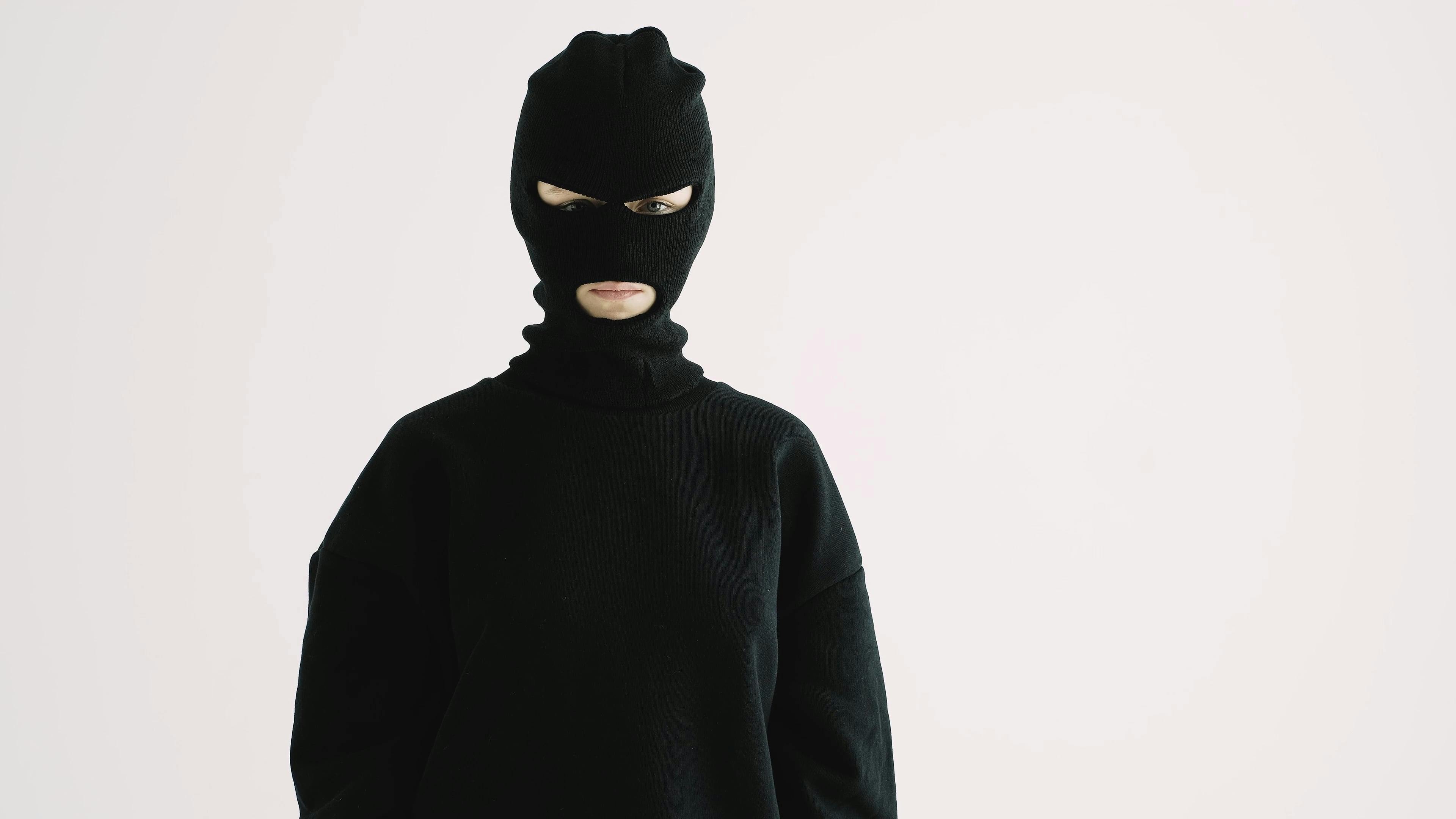 Person Wearing Balaclava Holding a Sign Free Stock Video Footage ...