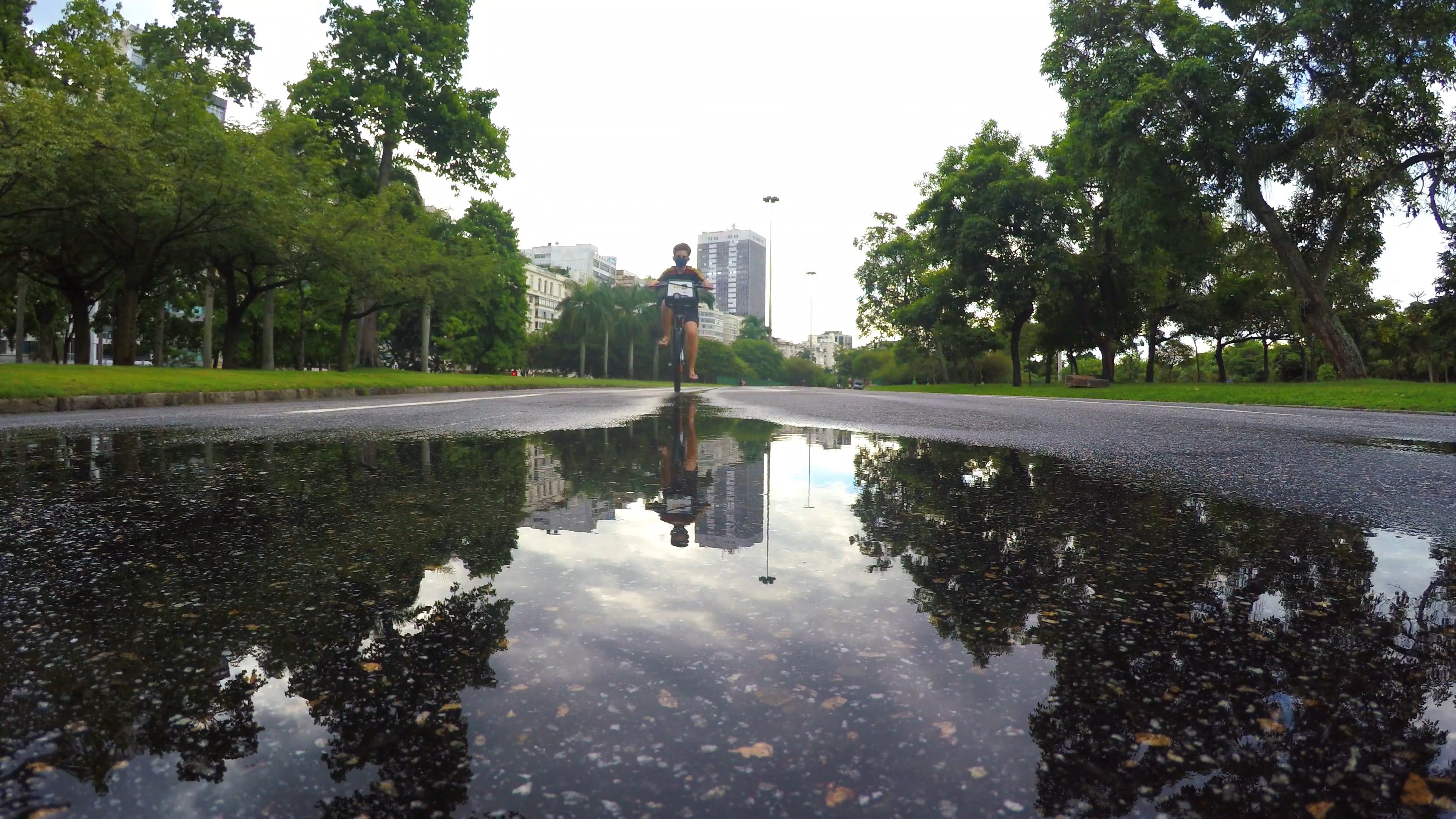 A Biker Riding Through A Puddle Free Stock Video Footage, Royalty-Free ...