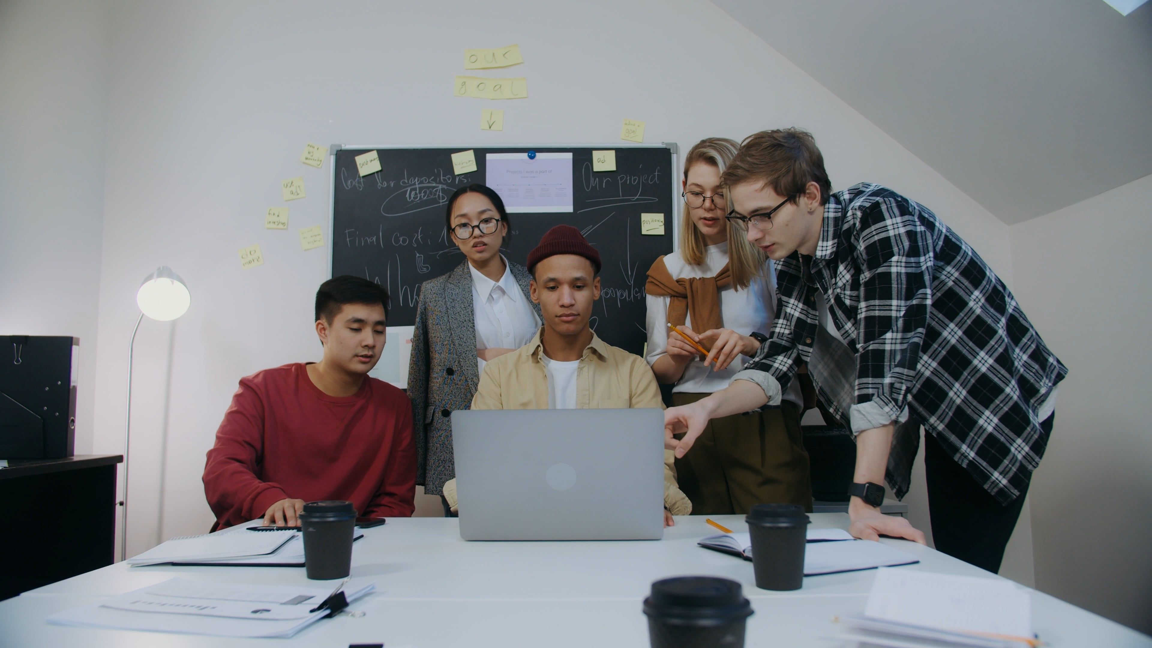 A Team Doing Brainstorming while Using Laptop Free Stock Video Footage ...