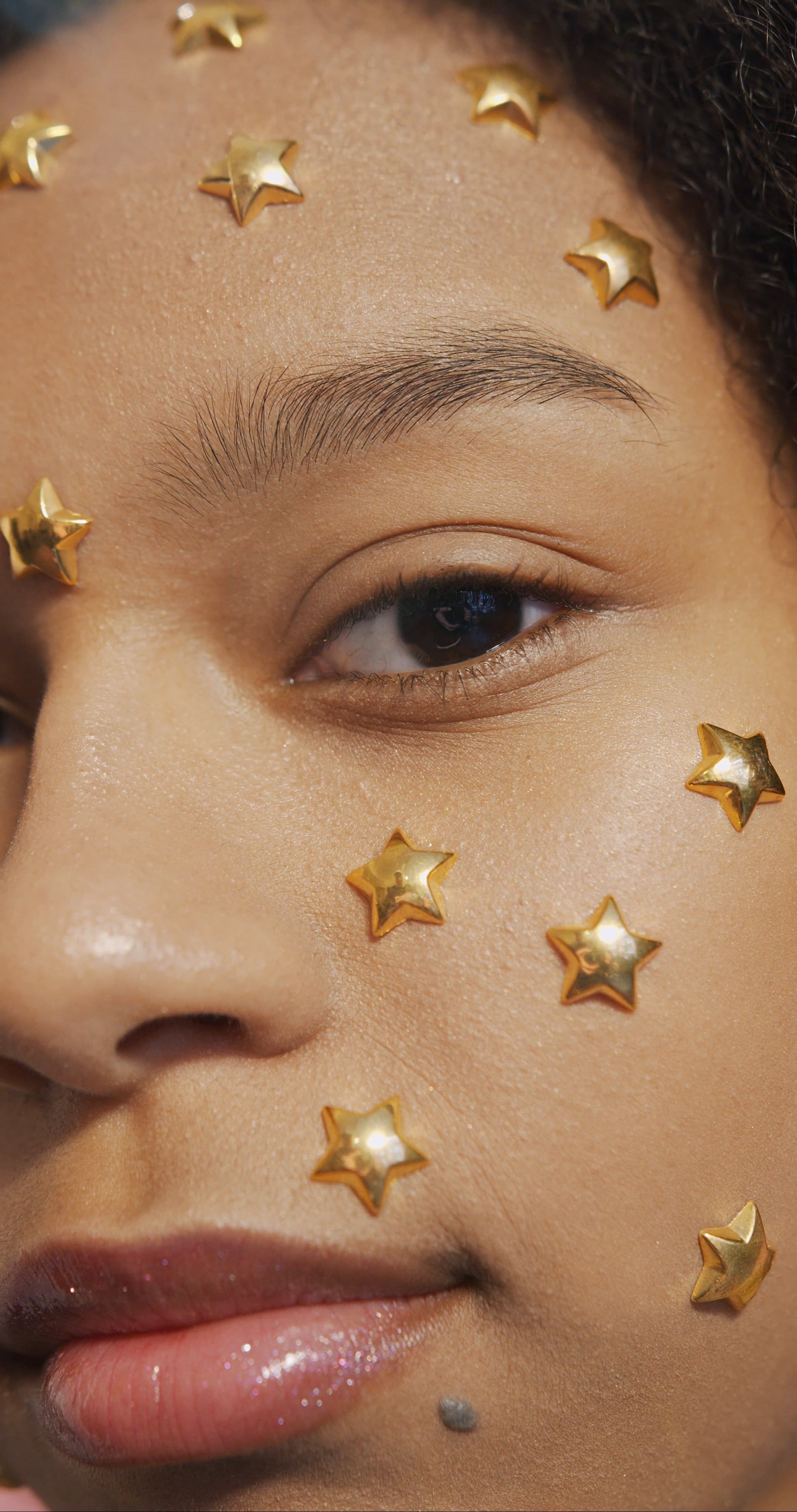 A Young Woman with Star Stickers on Her Face Free Stock Video Footage ...