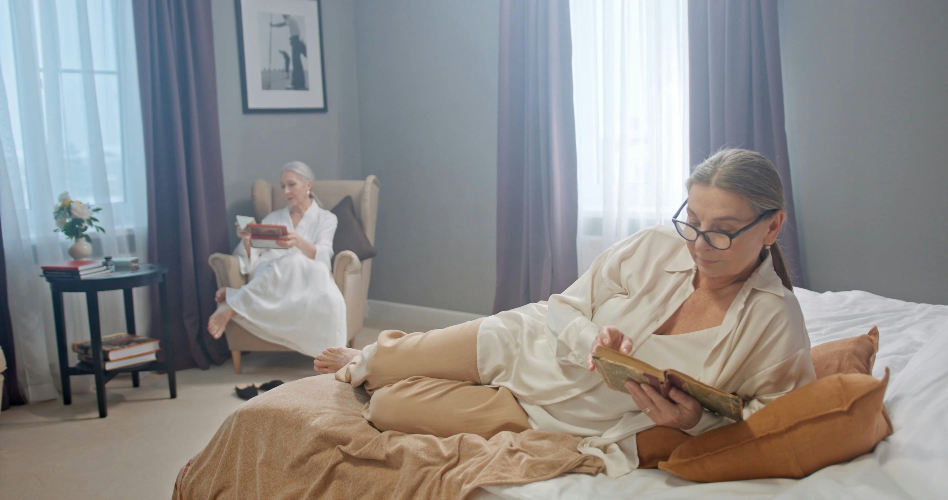 Couple Reading in Bedroom · Free Stock Video