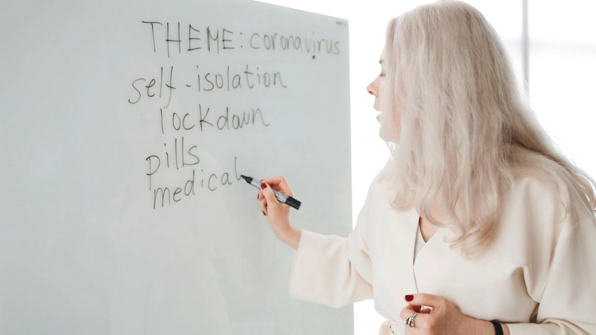 Photo Of Professor Writing On White Board · Free Stock Video