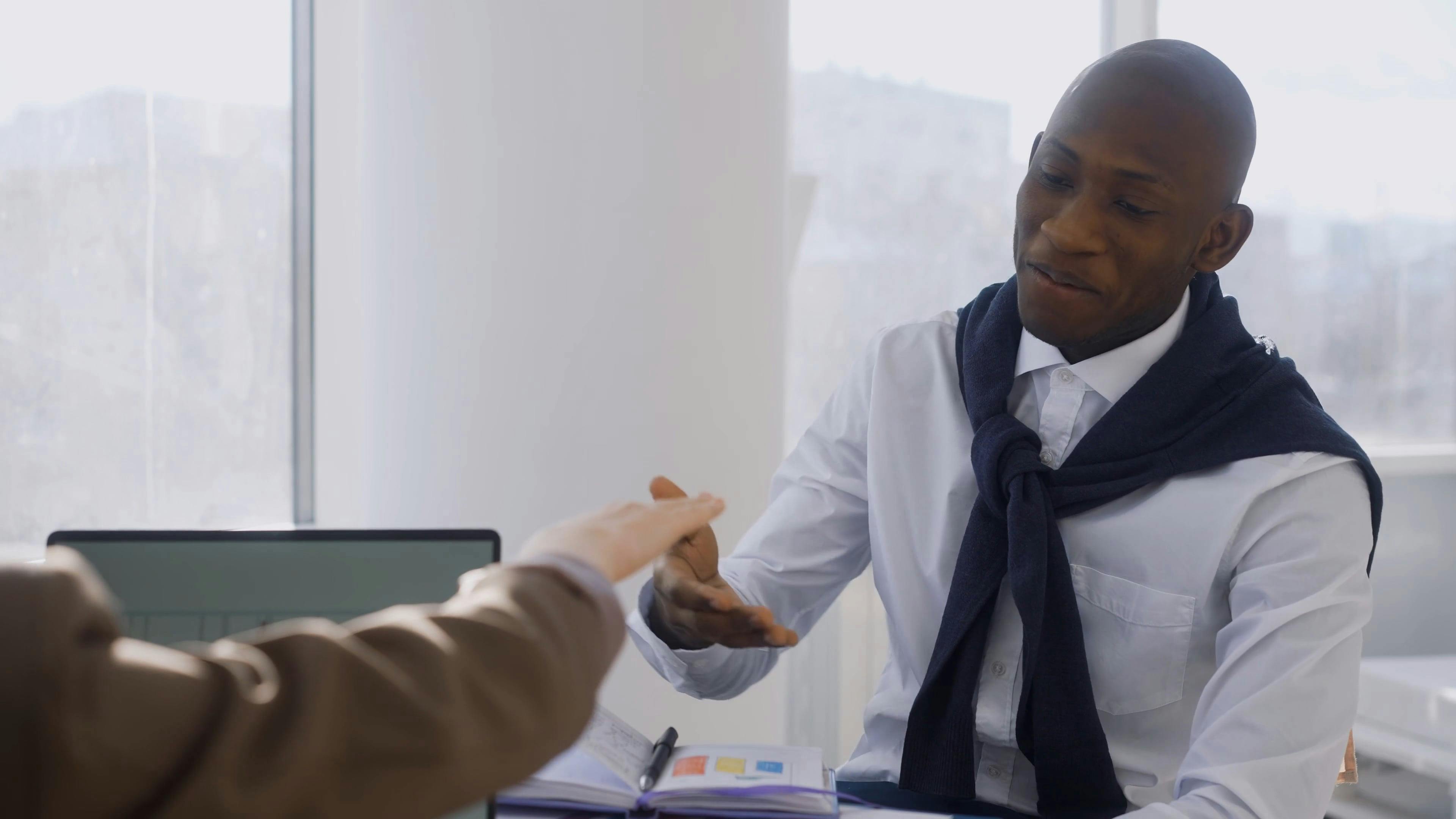 Person Shaking the Hand of a Man · Free Stock Video