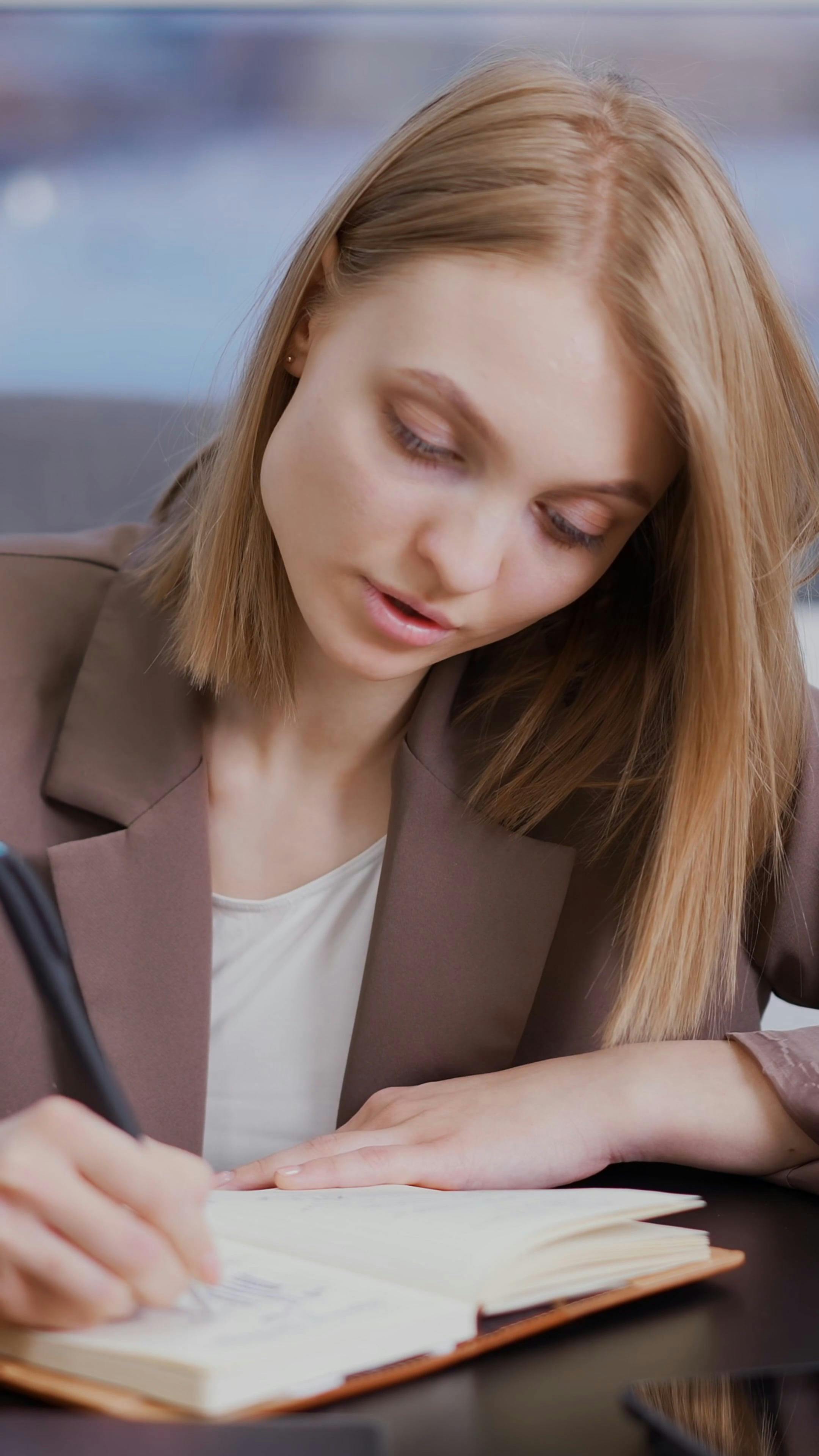 Woman Agreeing On Someone While Writing Notes Free Stock Video Footage ...