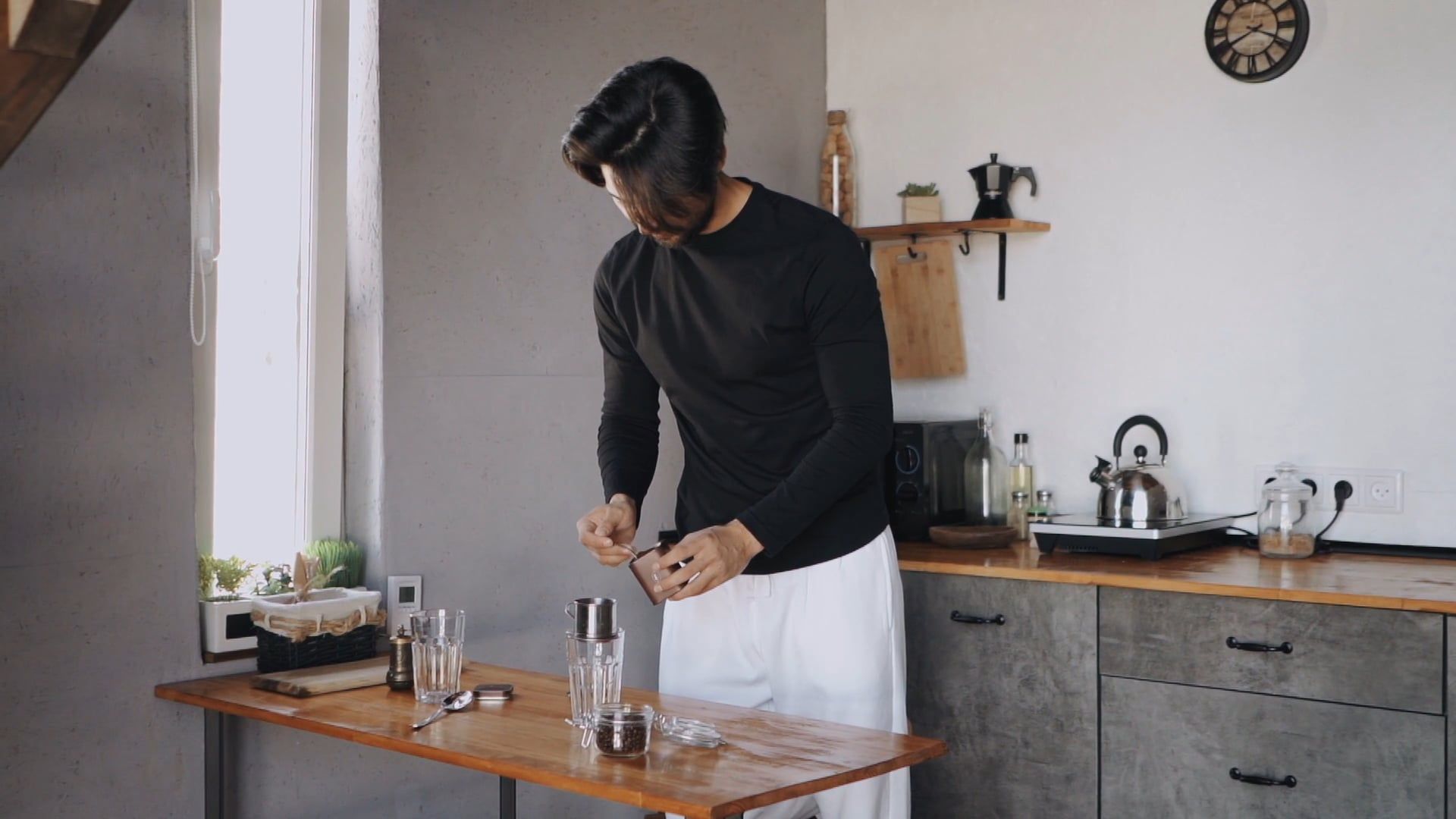 A Man Putting Coffee Powder on a Small Strainer Free Stock Video ...