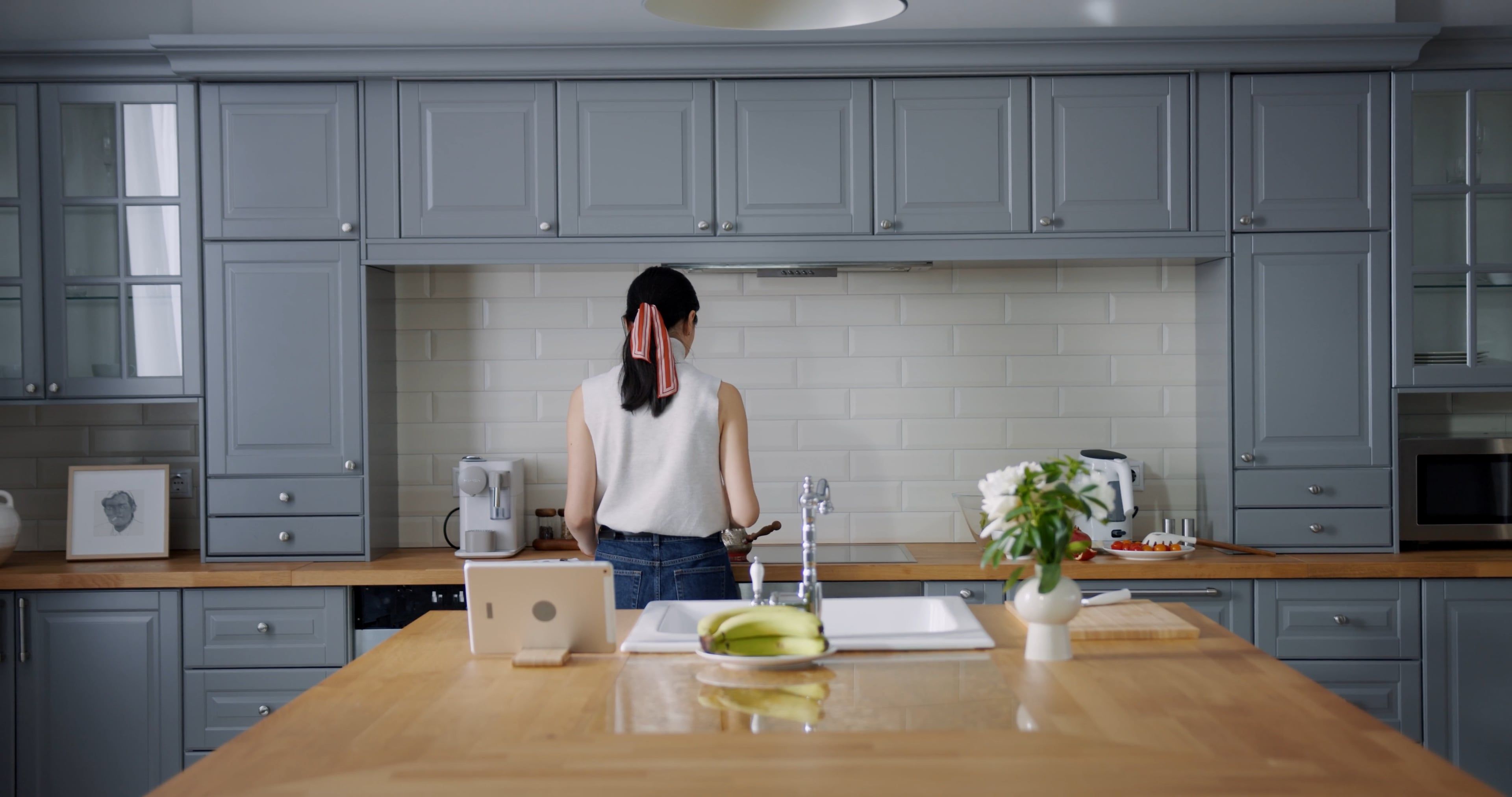 A Woman Standing at the Kitchen Counter Free Stock Video Footage ...