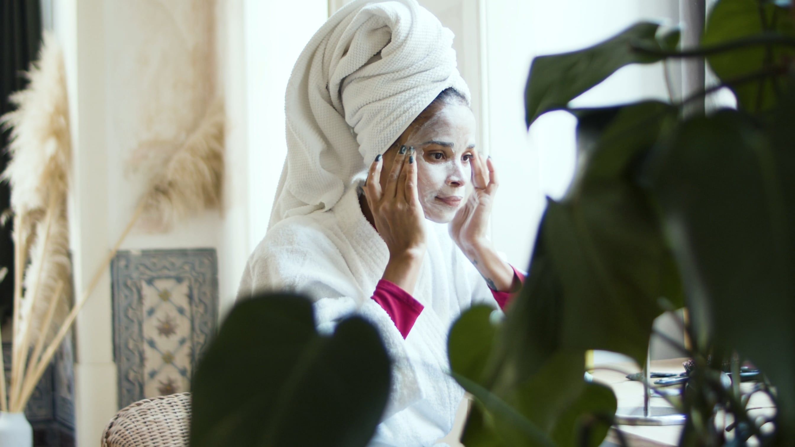 A Woman Applying Cream On Her Face · Free Stock Video