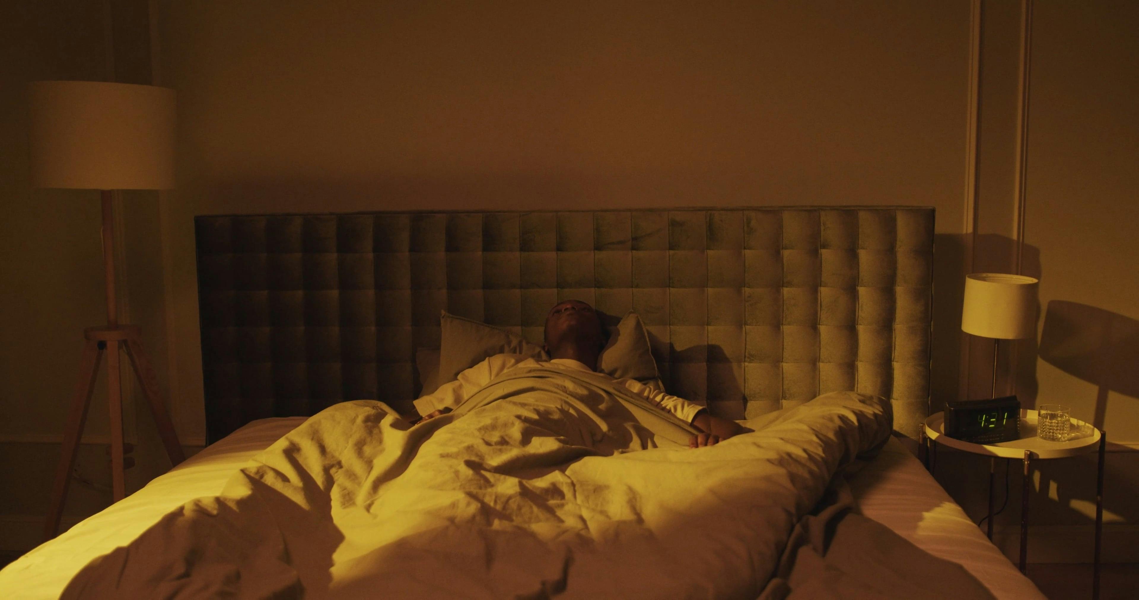 A Man Lying Down On The Bed · Free Stock Video