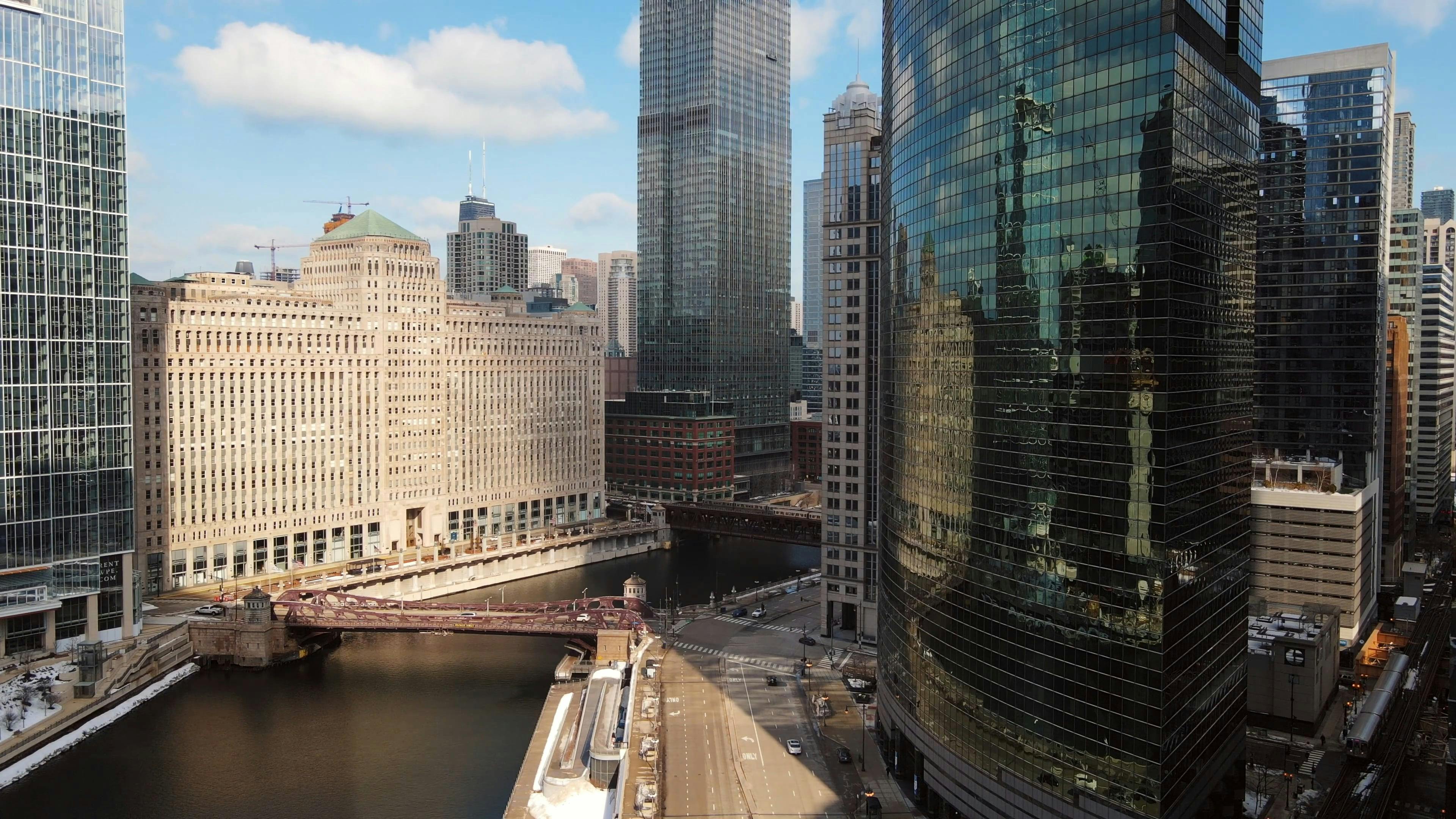 River in the middle of Tall Buildings · Free Stock Video