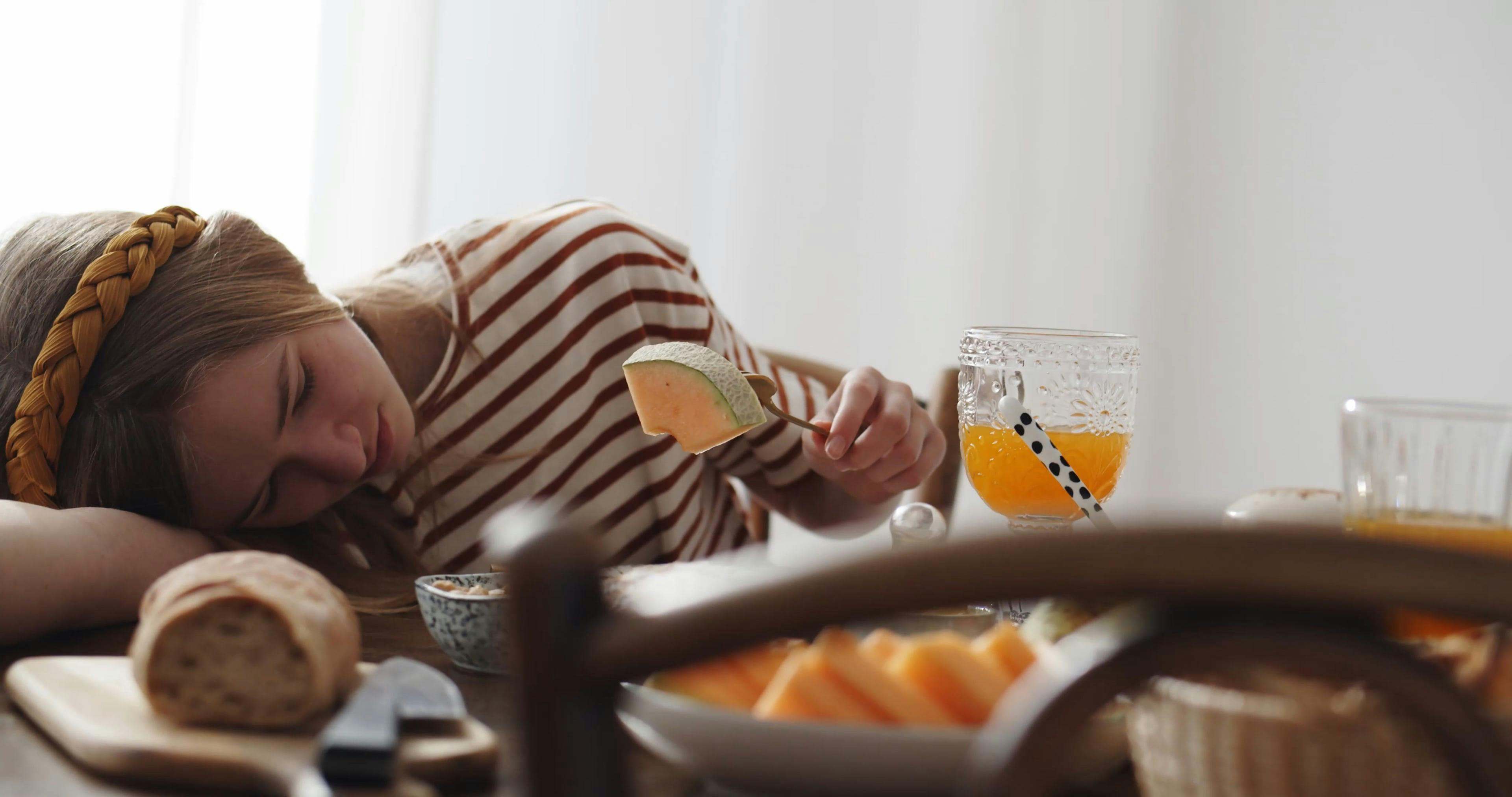 Girl Resting Her Head on a Dining Table Free Stock Video Footage ...