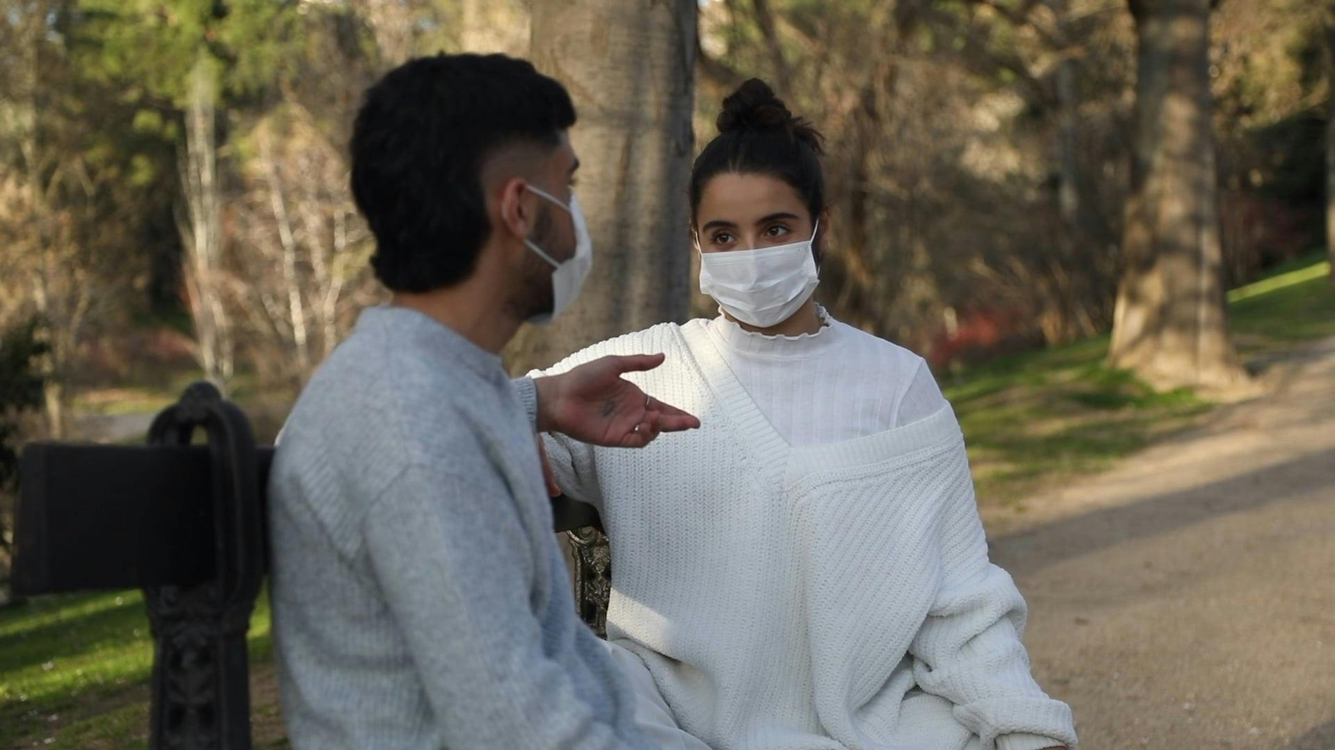 Man and Woman Talking while Wearing their Face Mask · Free Stock Video