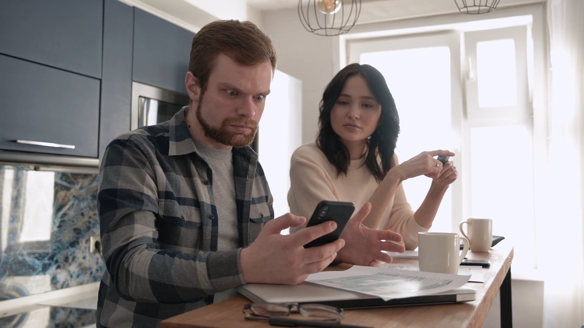 A Couple Looking at a Smartphone Screen · Free Stock Video