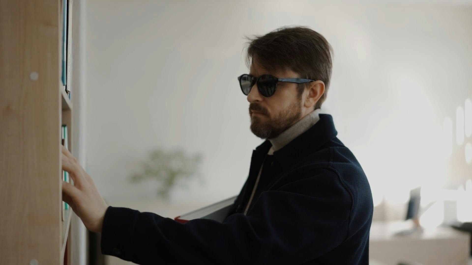 A Blind Man Searching for a Book in a Bookcase Free Stock Video Footage ...