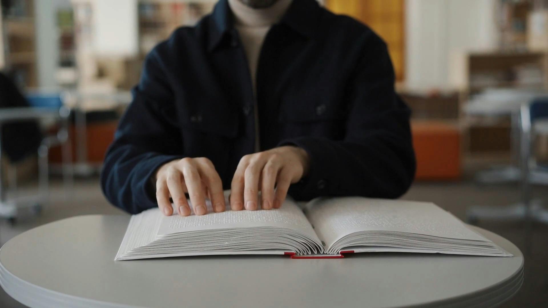 Blind Little Girl Reading Braille Book · Free Stock Video
