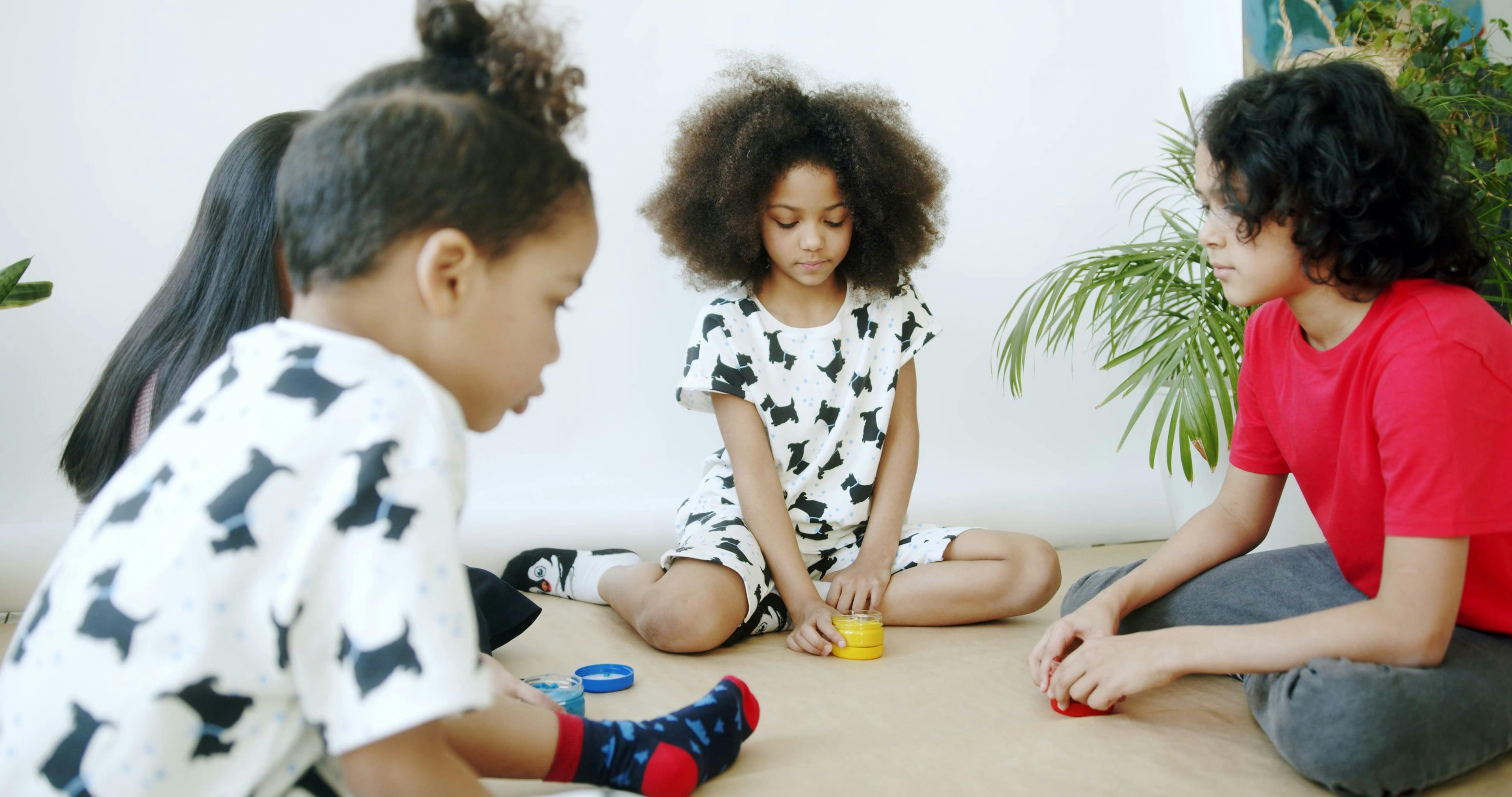 Children Playing with Colored Liquids in Plastic Containers Free Stock ...