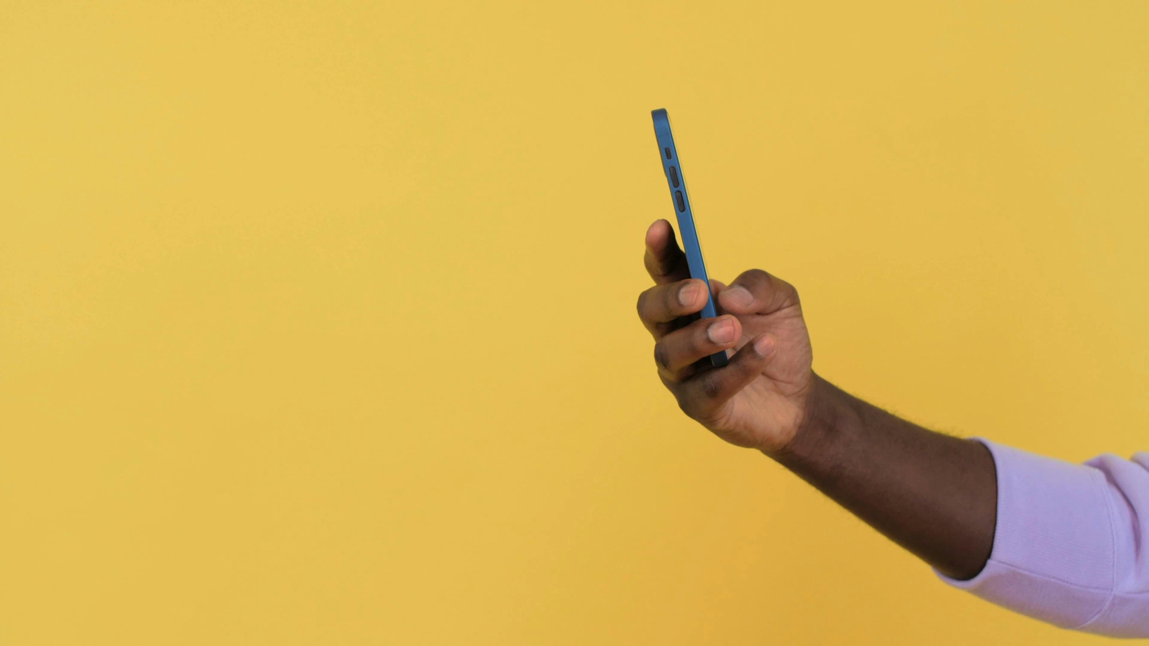 Female Hand Scrolling Mobile Phone · Free Stock Video