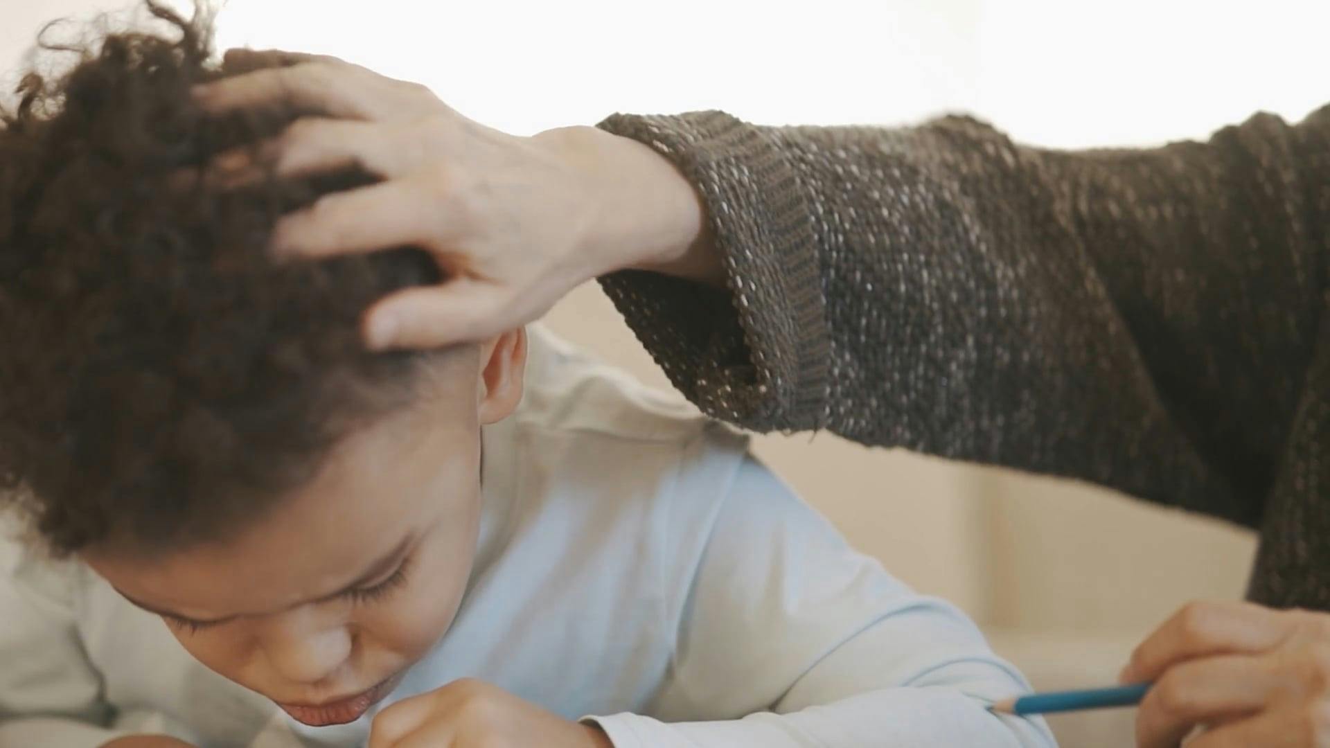 A Person Touching a Child's Head · Free Stock Video A Person Touching a Child's Head · Free Stock Video