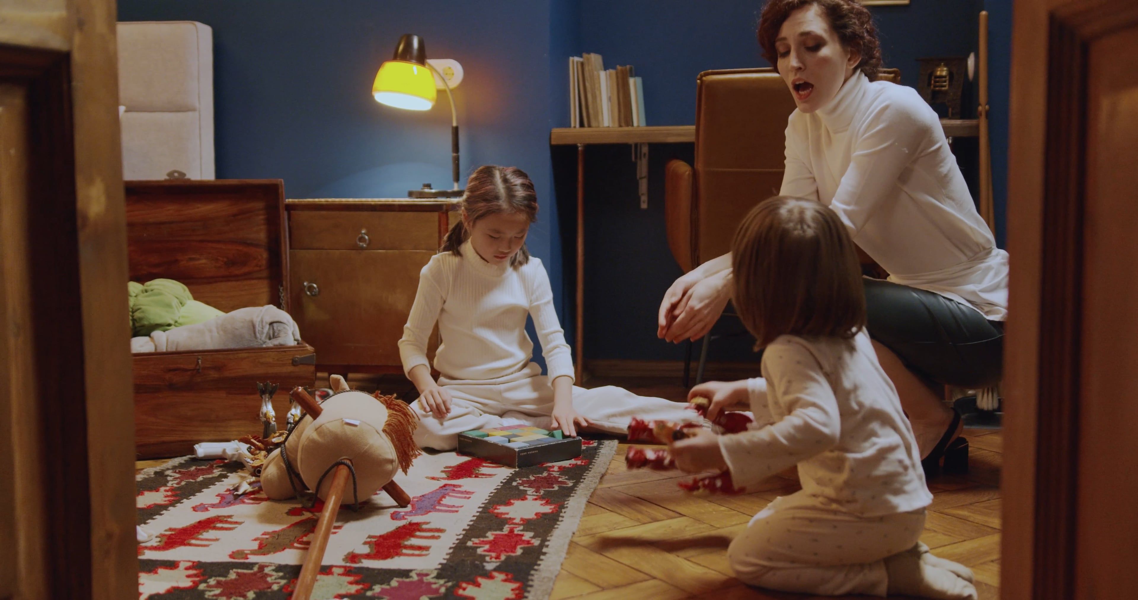 A Woman Babysitting the Girls in the Room Free Stock Video Footage ...