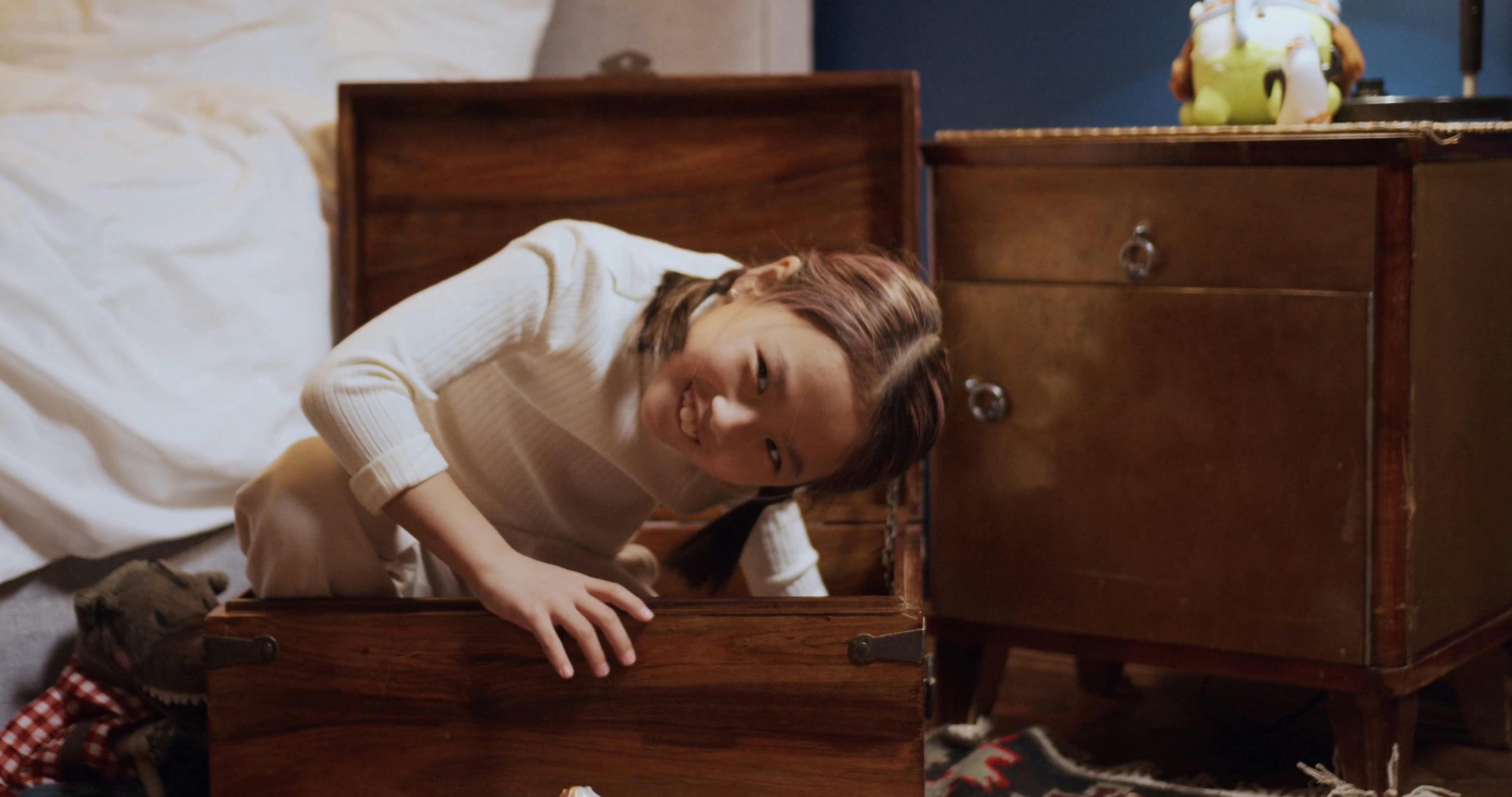 A Little Girl Hiding in a Chest Free Stock Video Footage, Royalty-Free ...