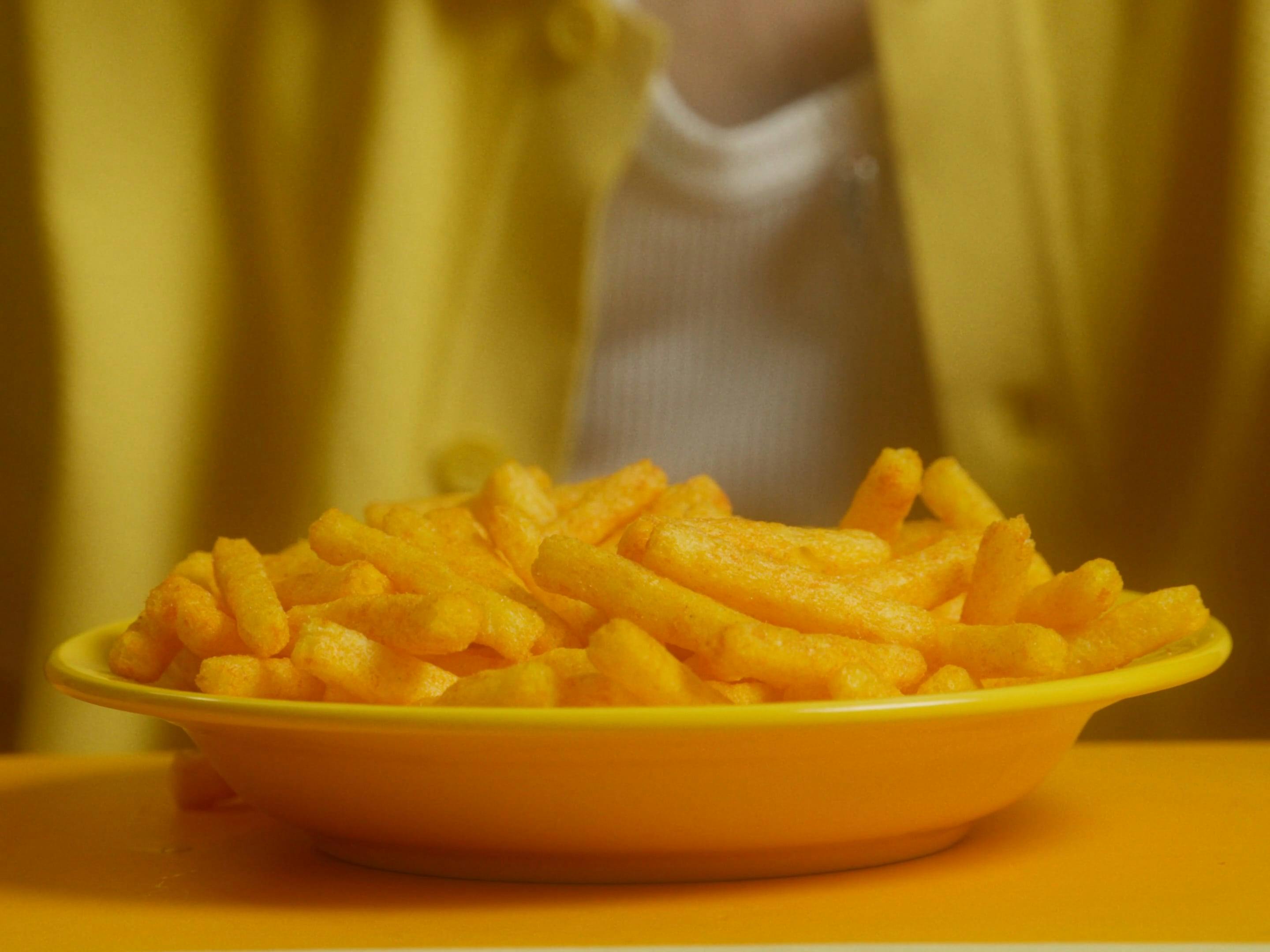 A Young Guy Grabbing A Handful Of Snacks Free Stock Video Footage ...