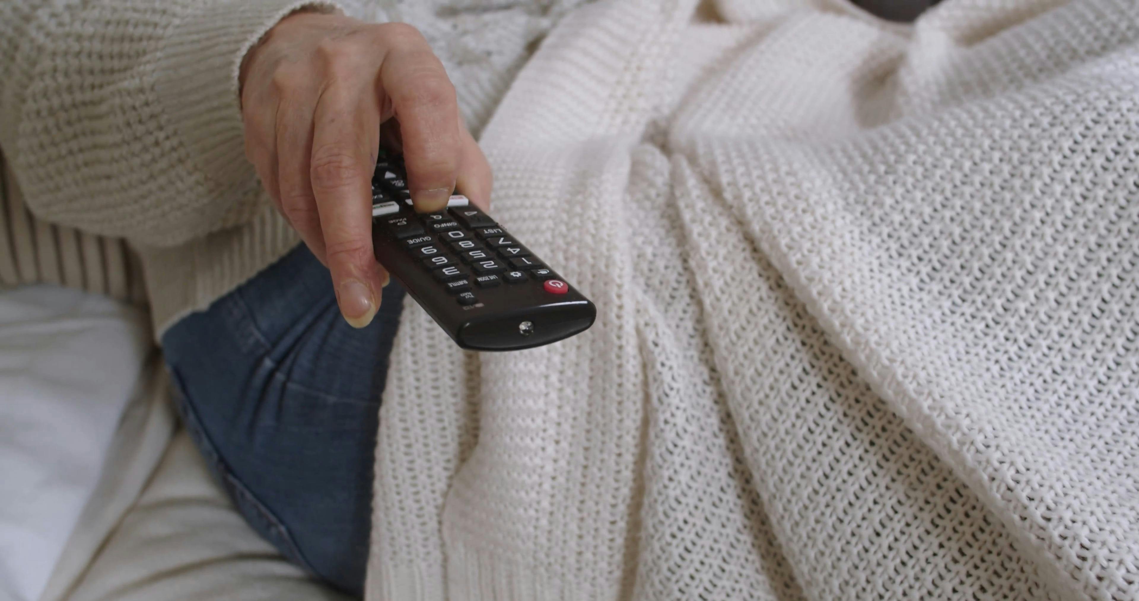 Close-Up Video of a Person Holding a Remote Controller Free Stock Video ...