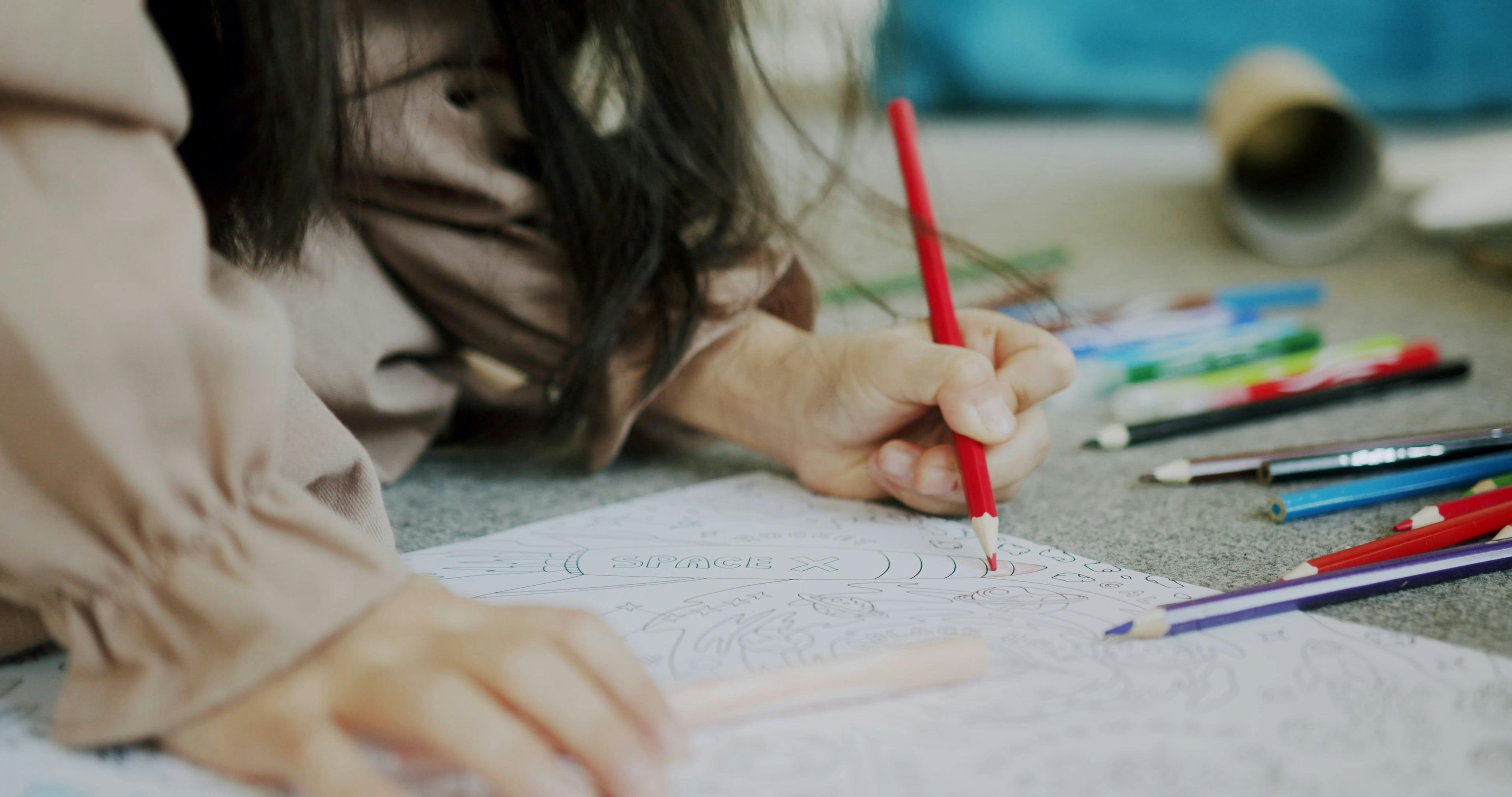 A Girl Coloring Her Drawing Free Stock Video Footage, Royalty-Free 4K ...