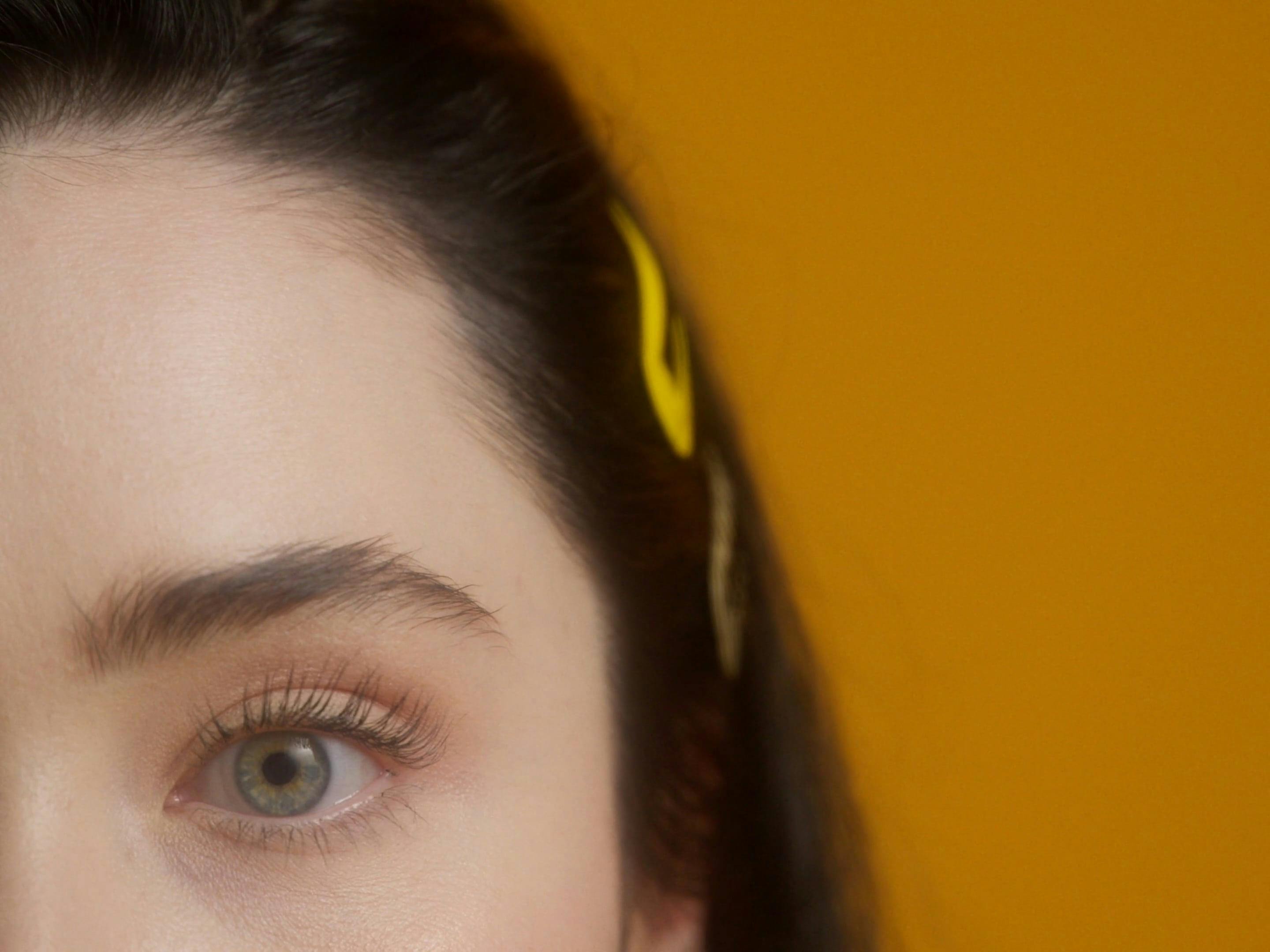 Hal Face Of A Woman Raising Her Right Eye Brow Free Stock Video Footage ...