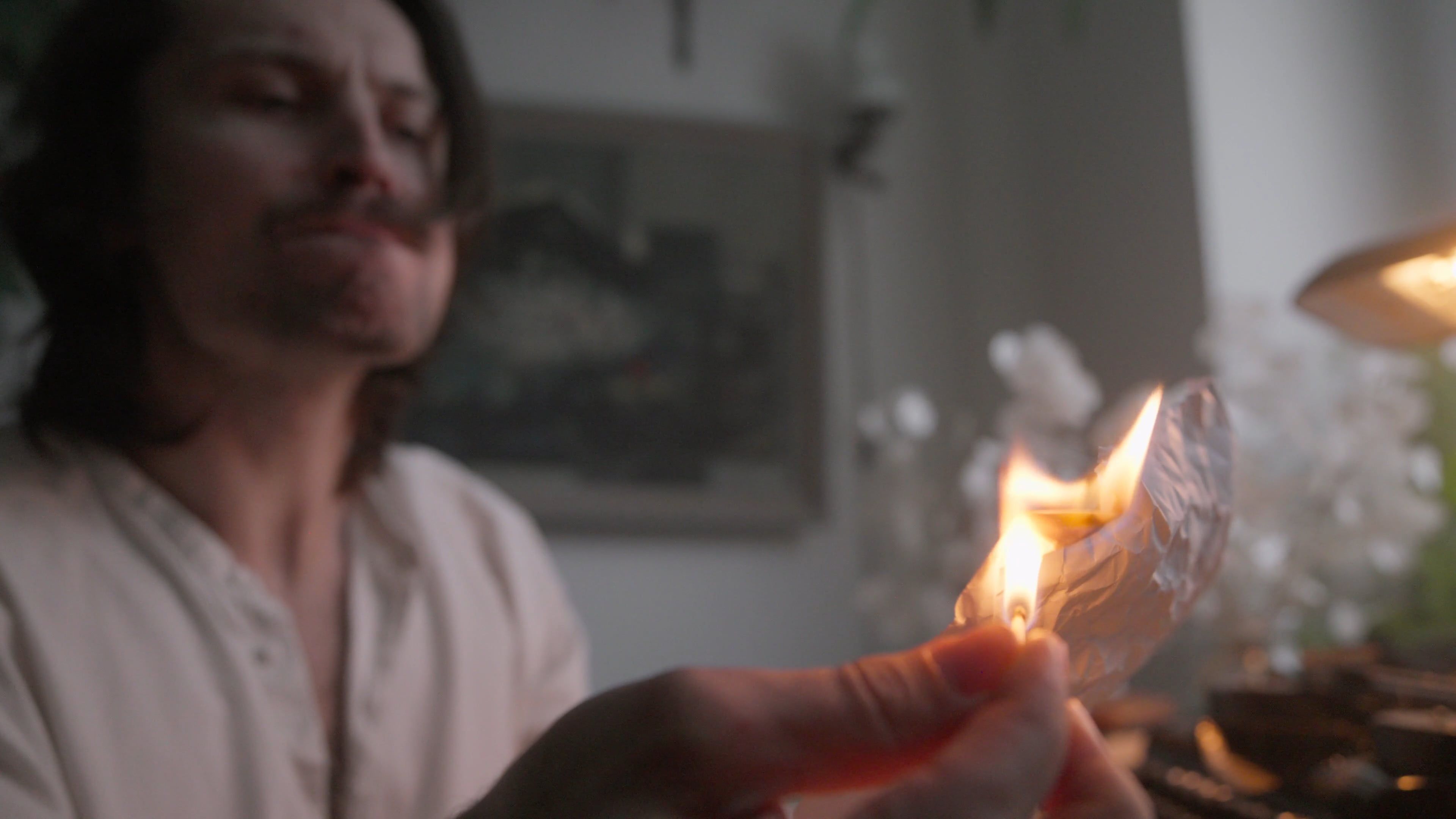Man Burning a Piece of Paper Free Stock Video Footage, Royalty-Free 4K ...
