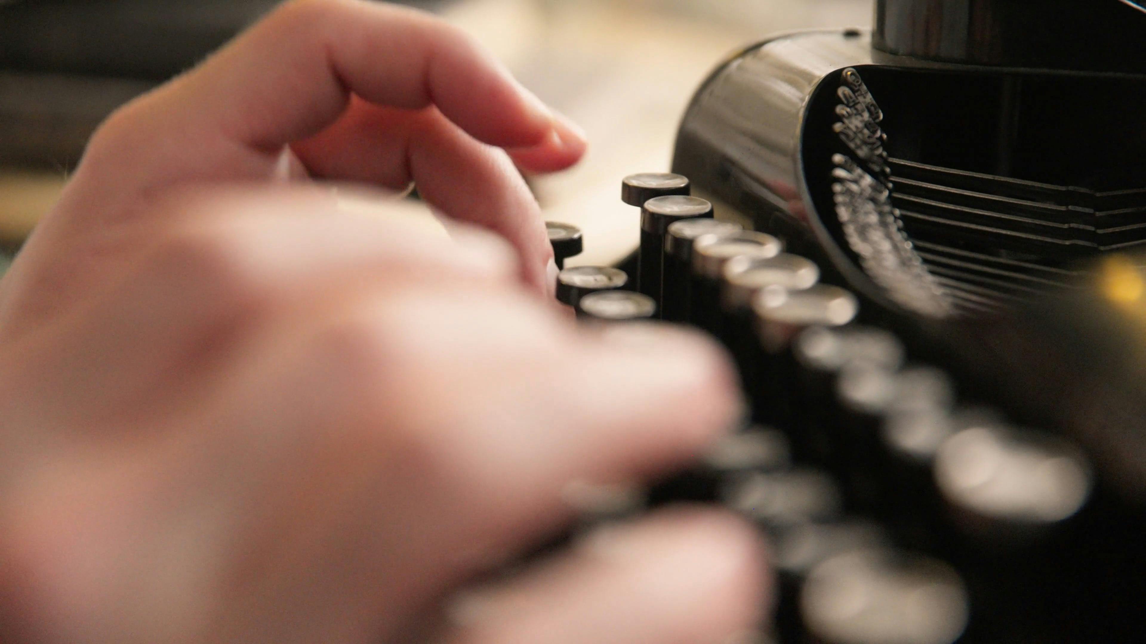 Close Up Shot of a Person Using Typewriter · Free Stock Video