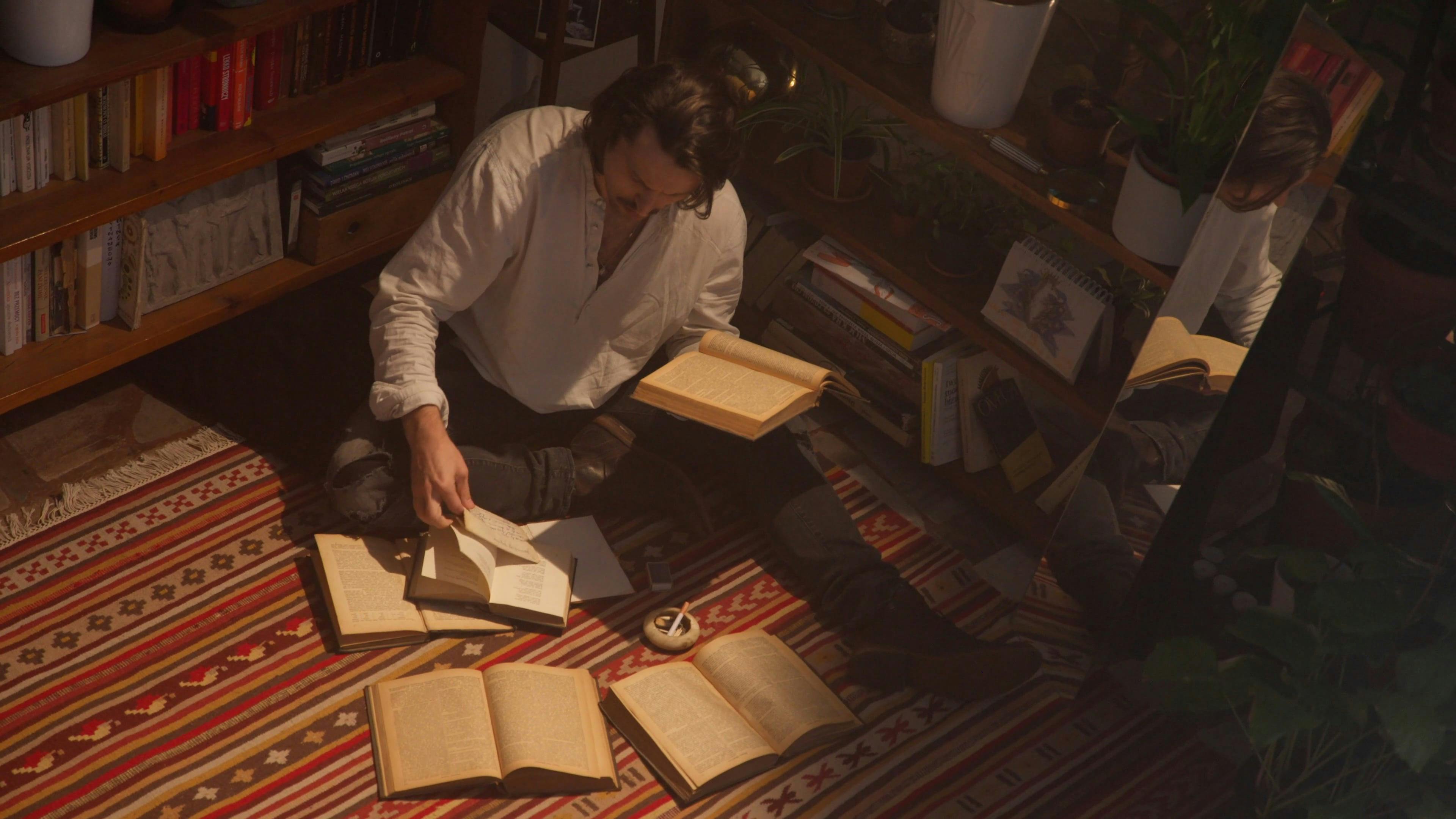 Man Looking at Books on The Floor Free Stock Video Footage, Royalty ...
