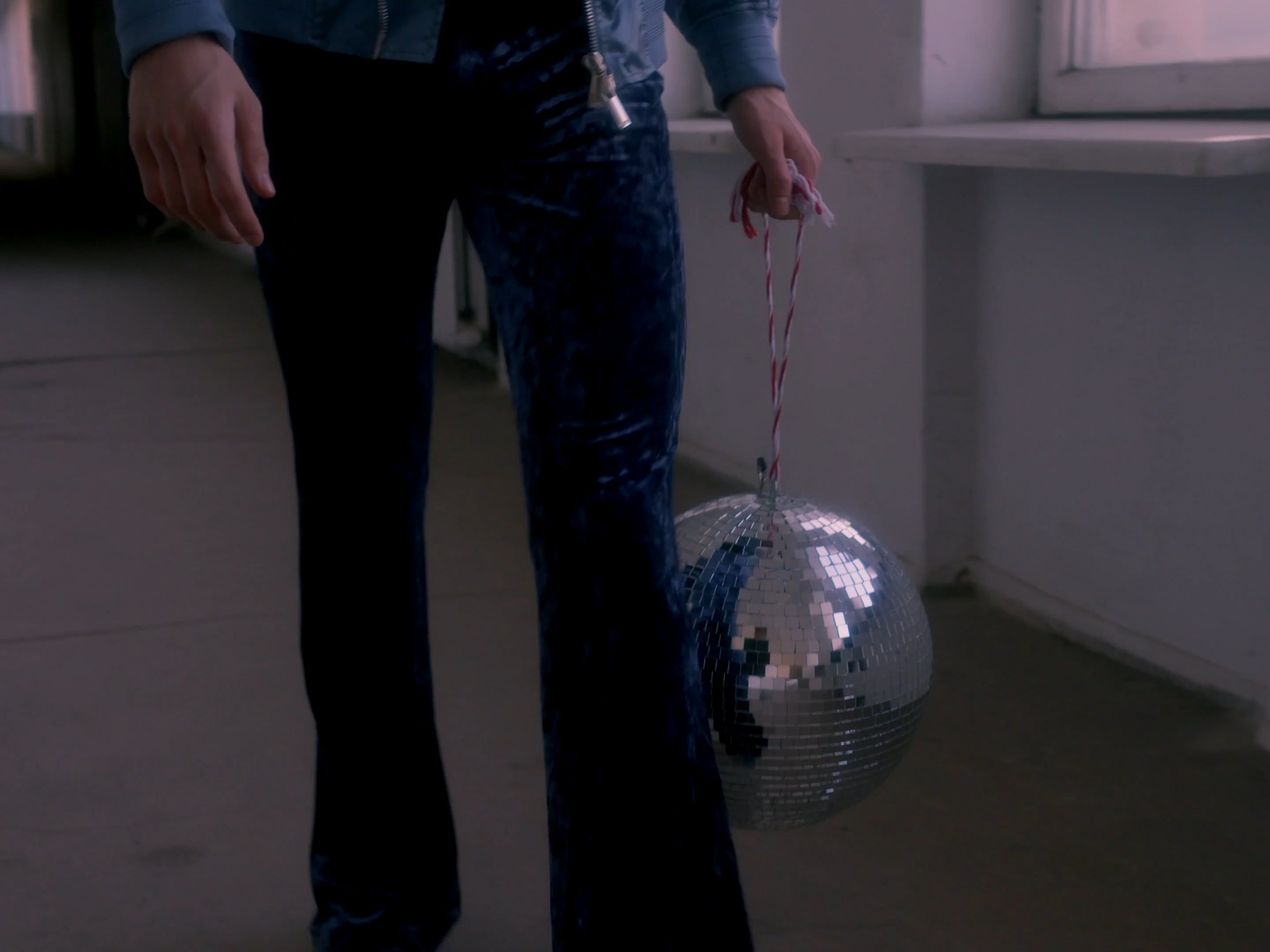 Young Man Walking with Disco Ball · Free Stock Video