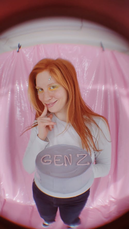 Young Woman Smiling While Holding a Cake · Free Stock Video Young Woman Smiling While Holding a Cake · Free Stock Video