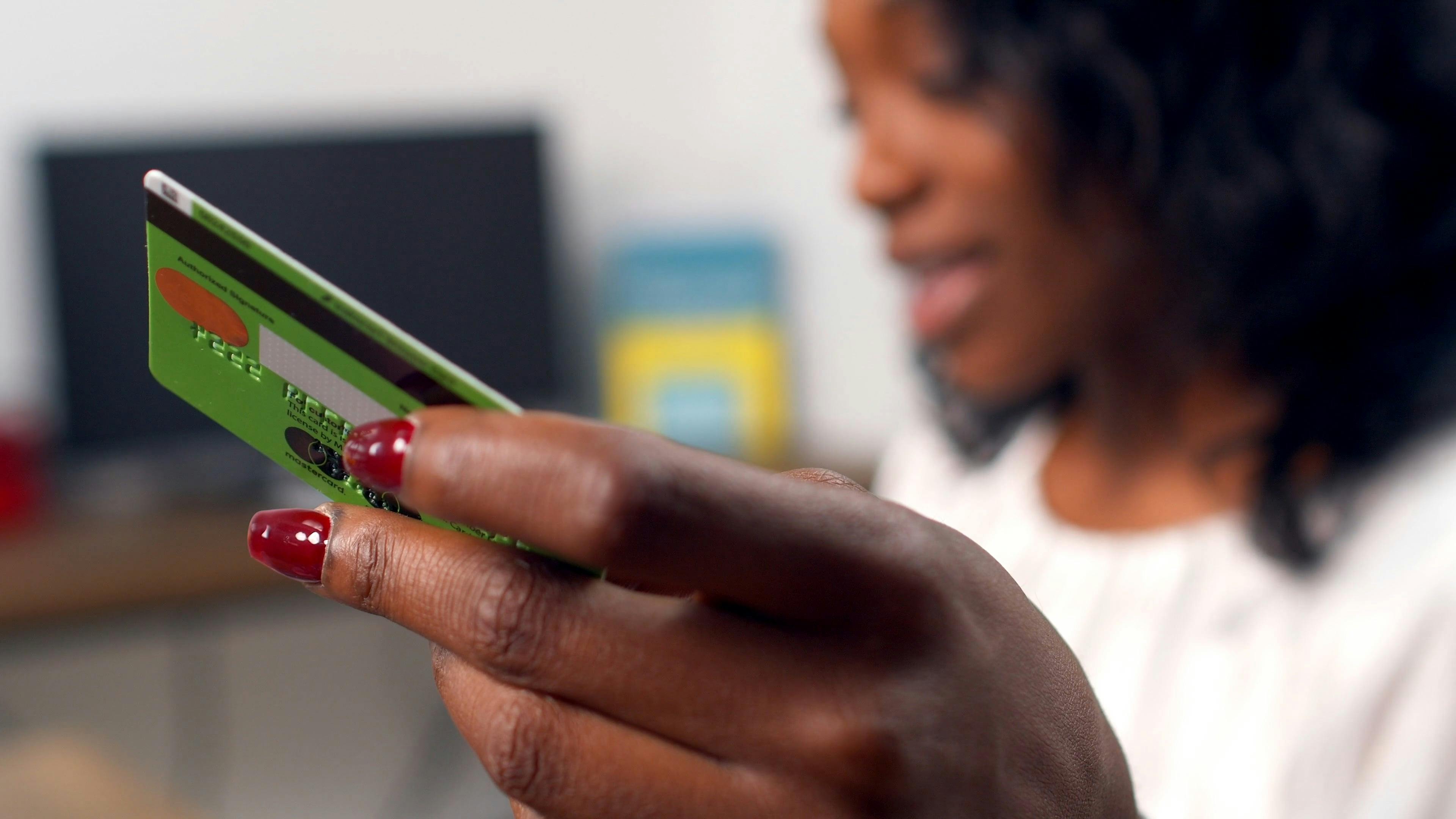 Closeup Video of a Person Holding a Credit Card Free Stock Video ...