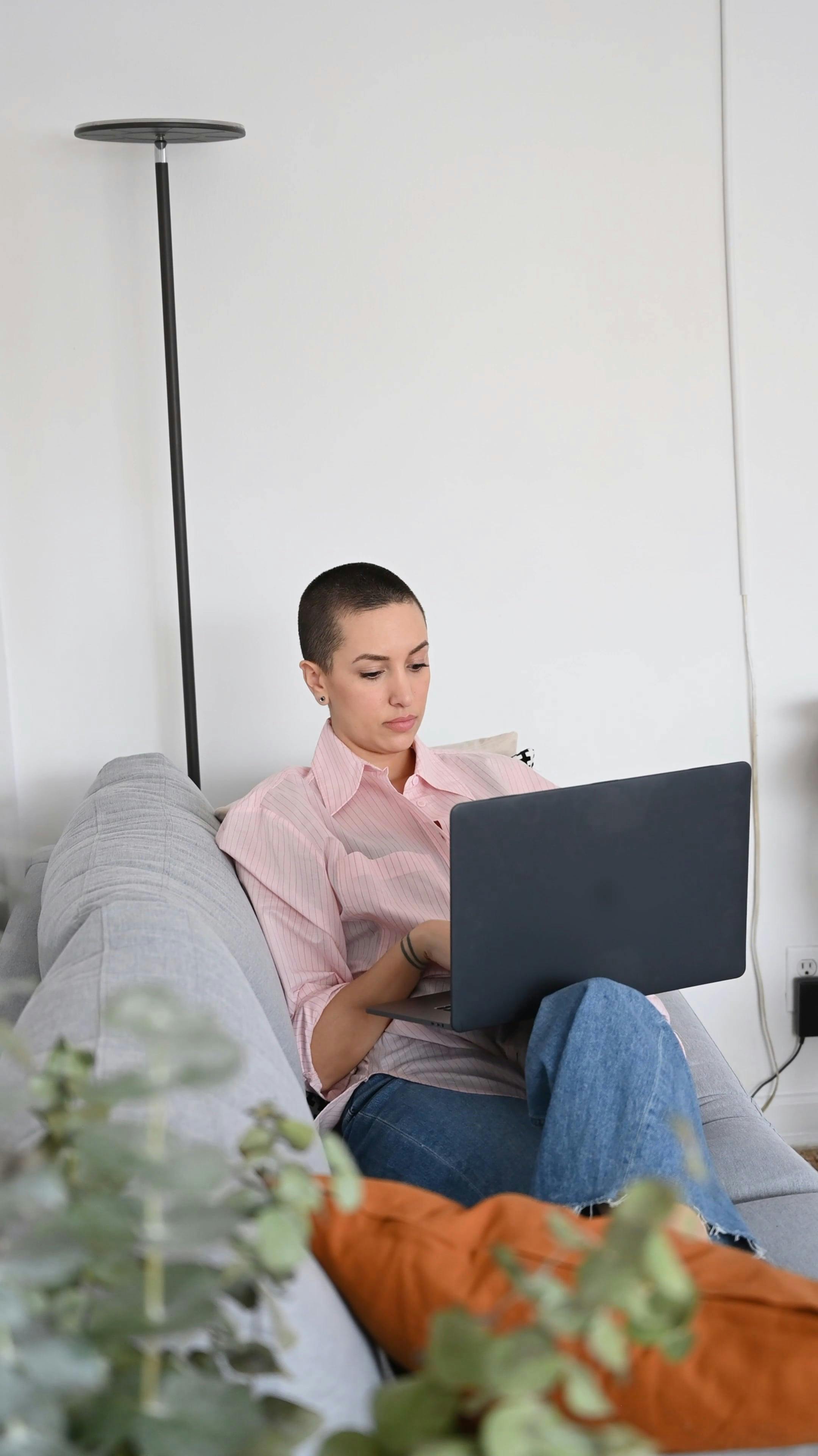 Woman Using a Laptop · Free Stock Video