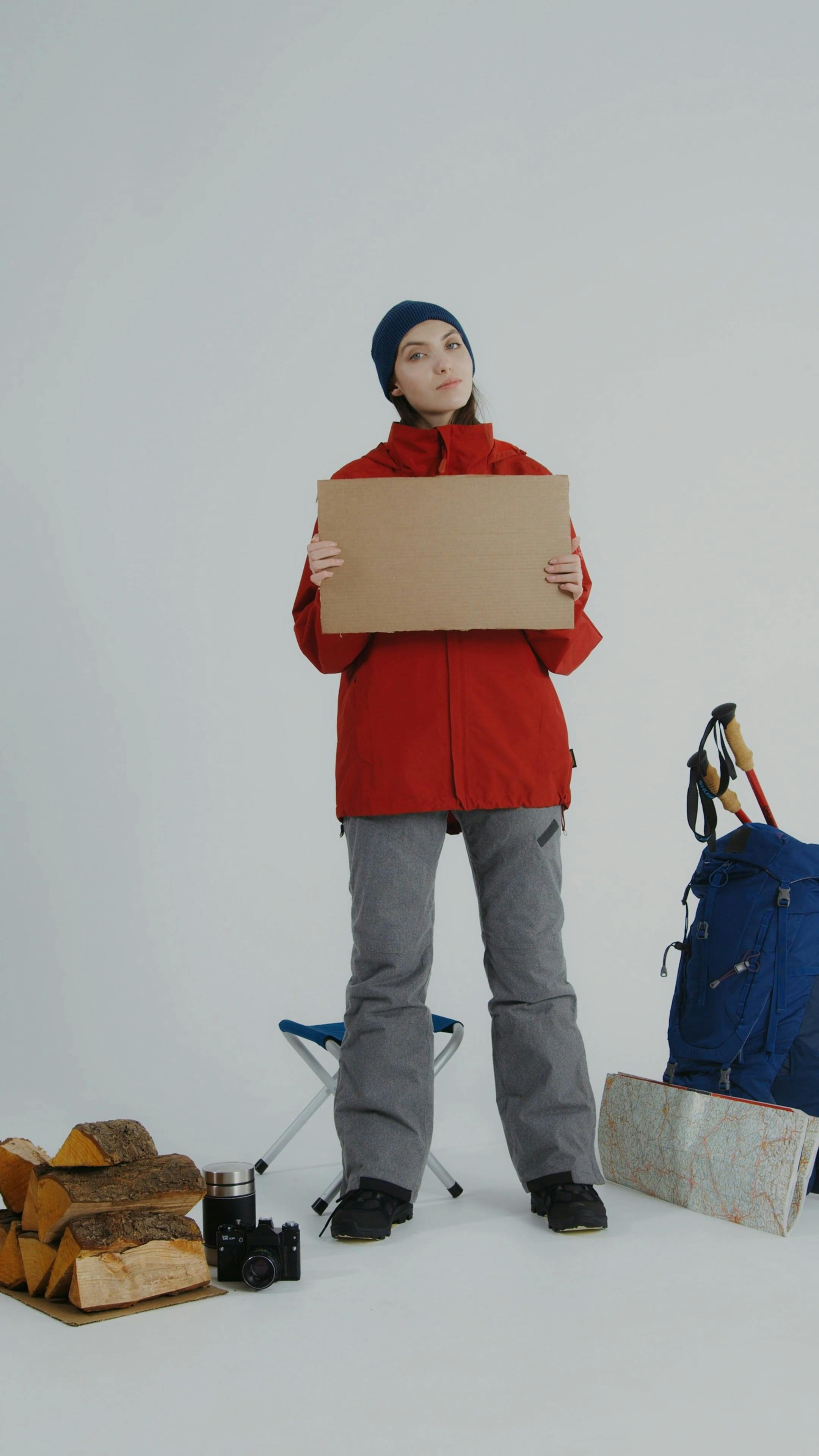 A Woman Holding a Cardboard · Free Stock Video