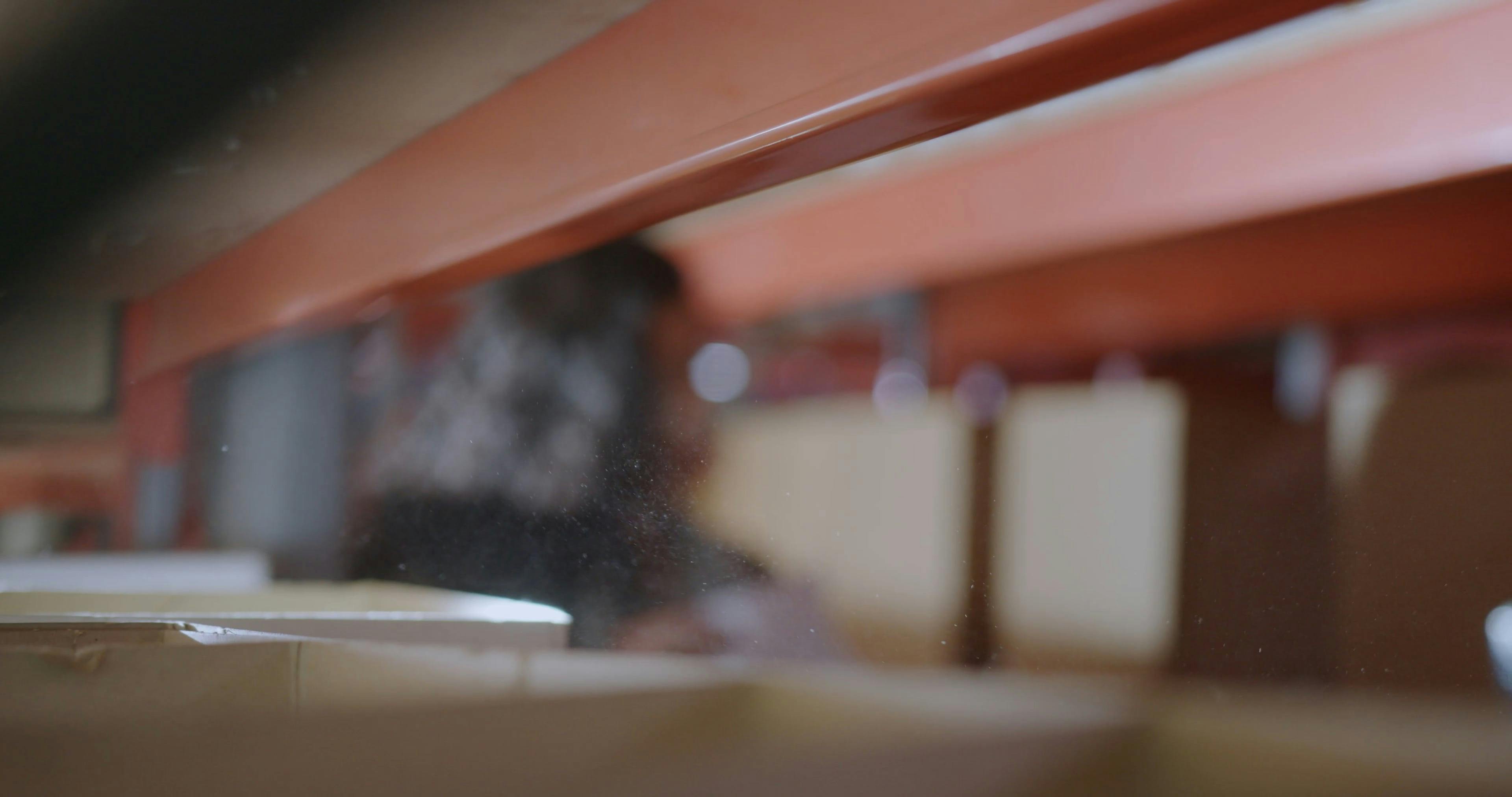Woman Model while Standing in an Aisle in Between the Racks Free Stock ...