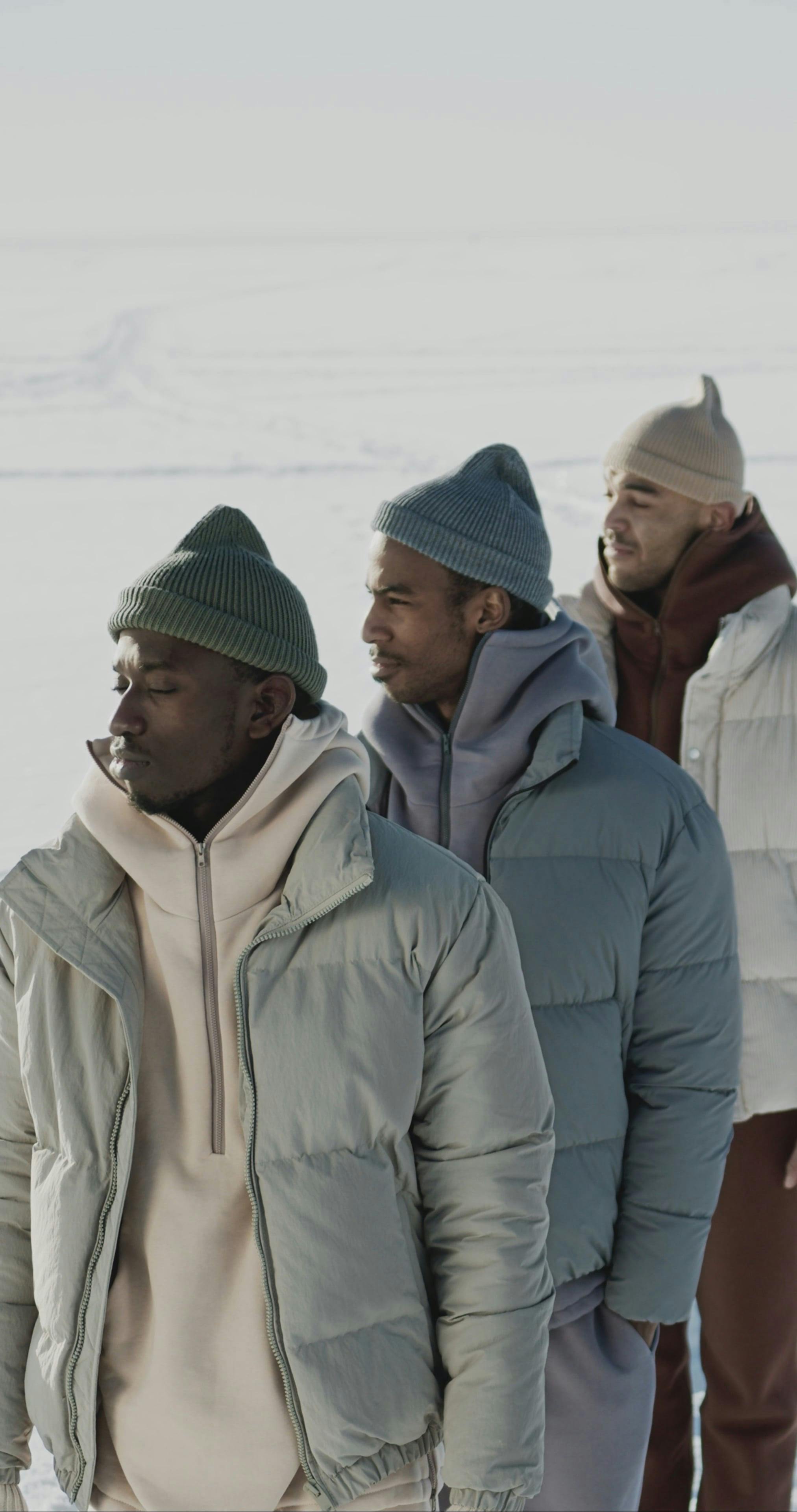 Men Standing in the Snow · Free Stock Video