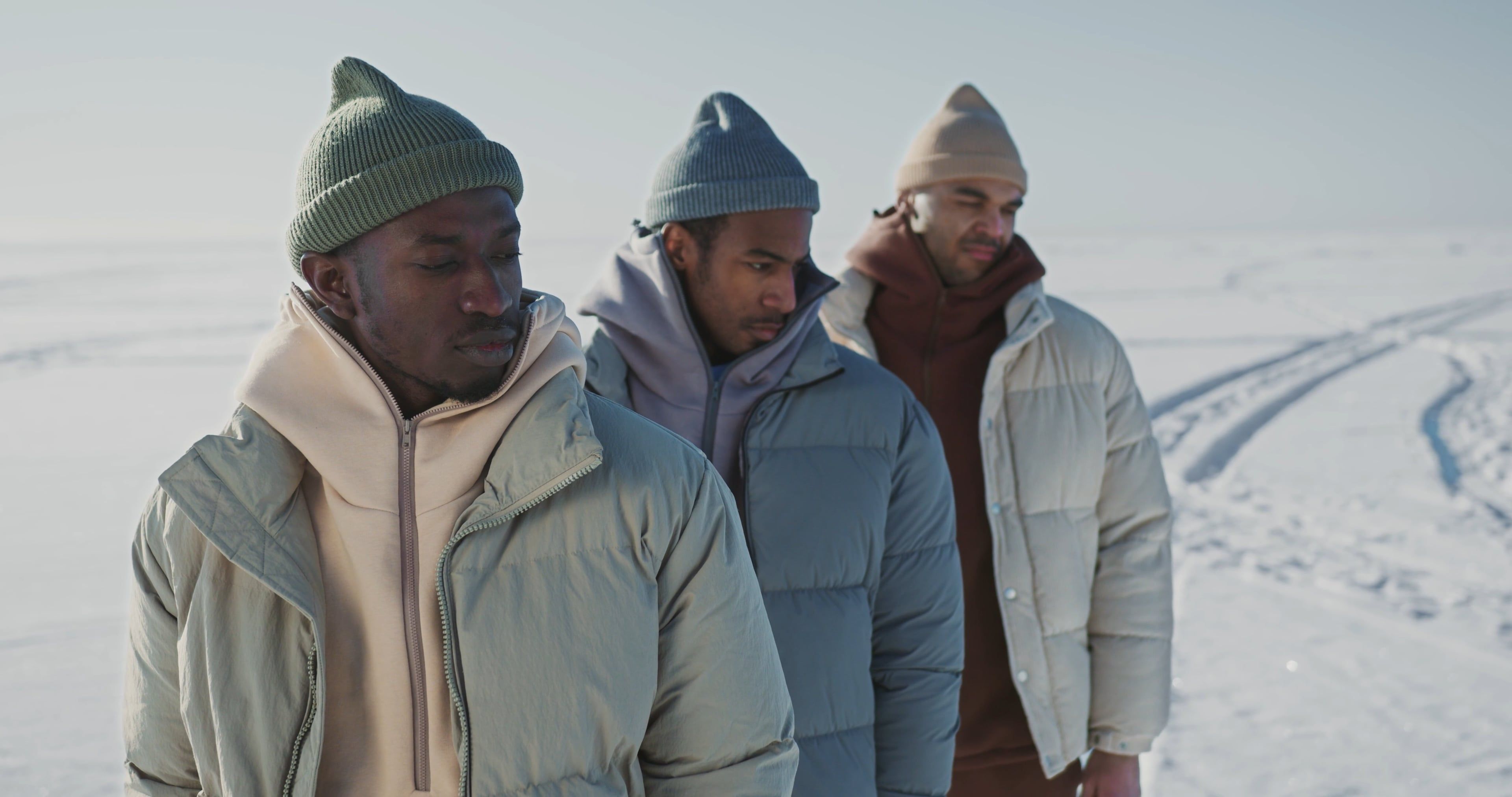 Men Standing in the Snow · Free Stock Video