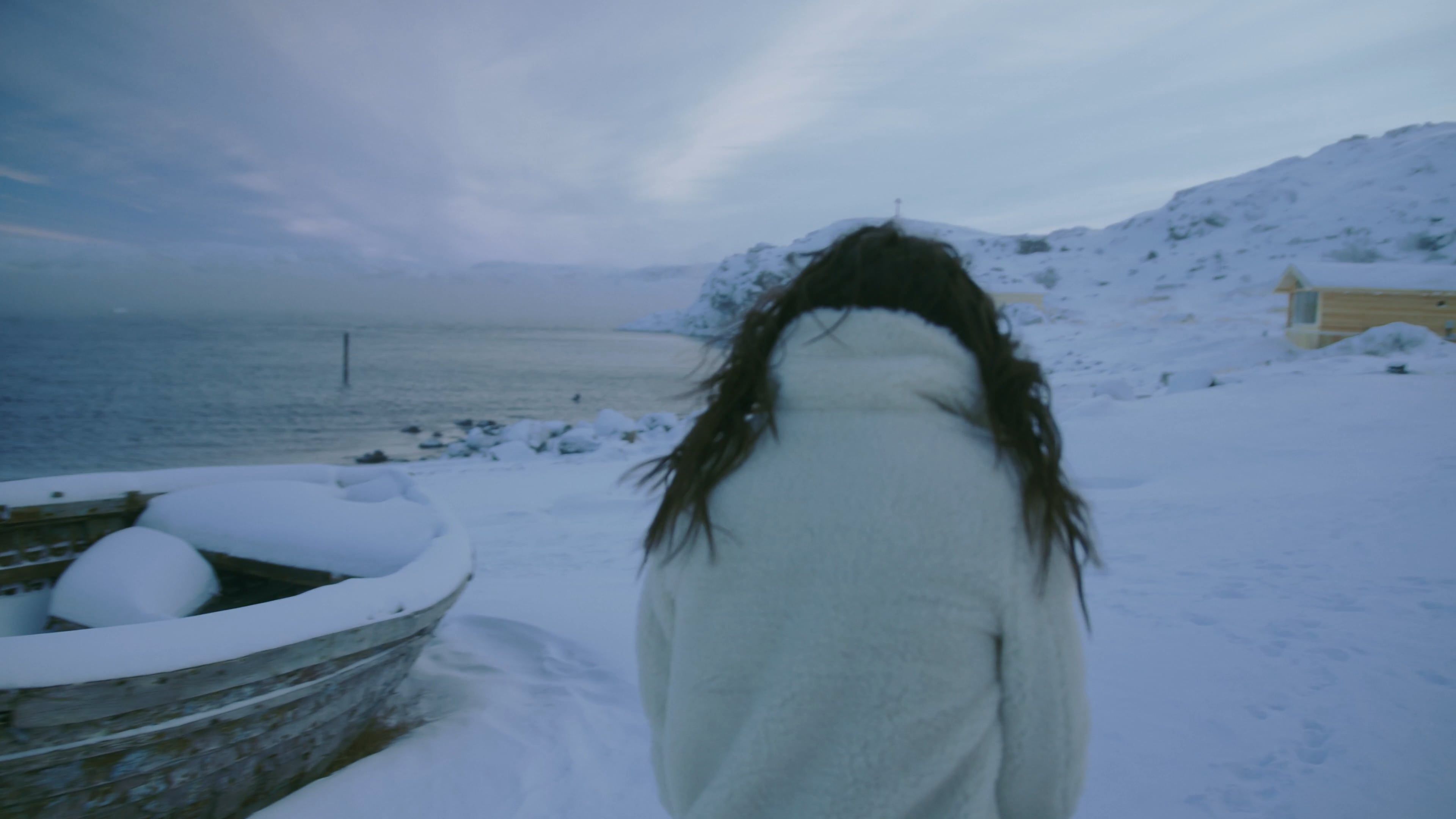 A Woman with Makeup and Red Lips in a Cold Environment · Free Stock Video