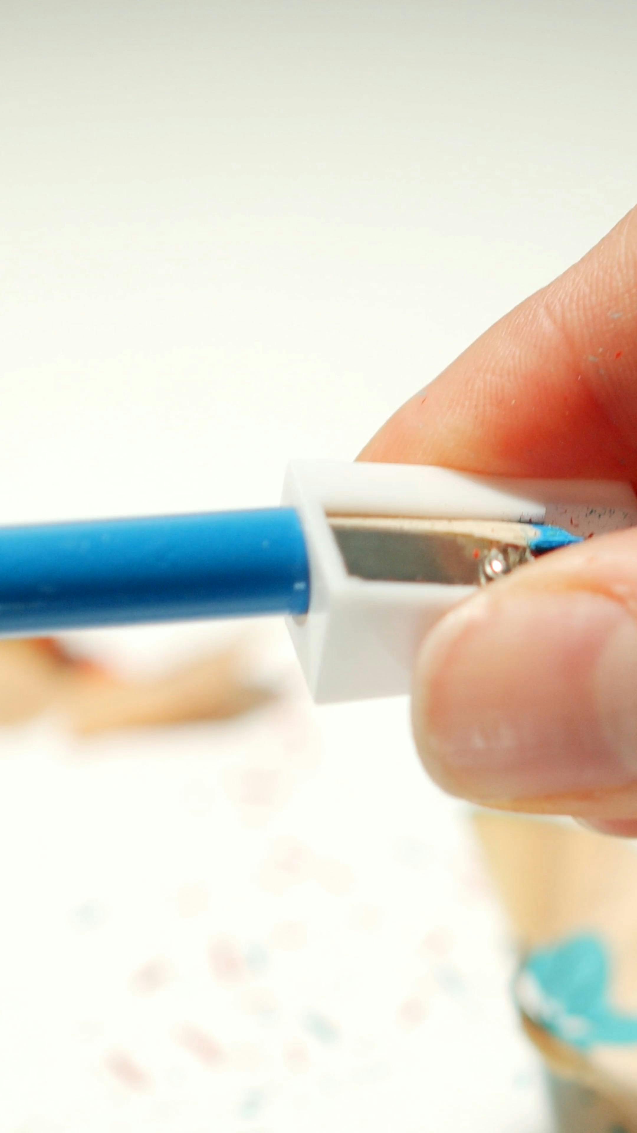 A Person Sharpening a Pencil · Free Stock Video