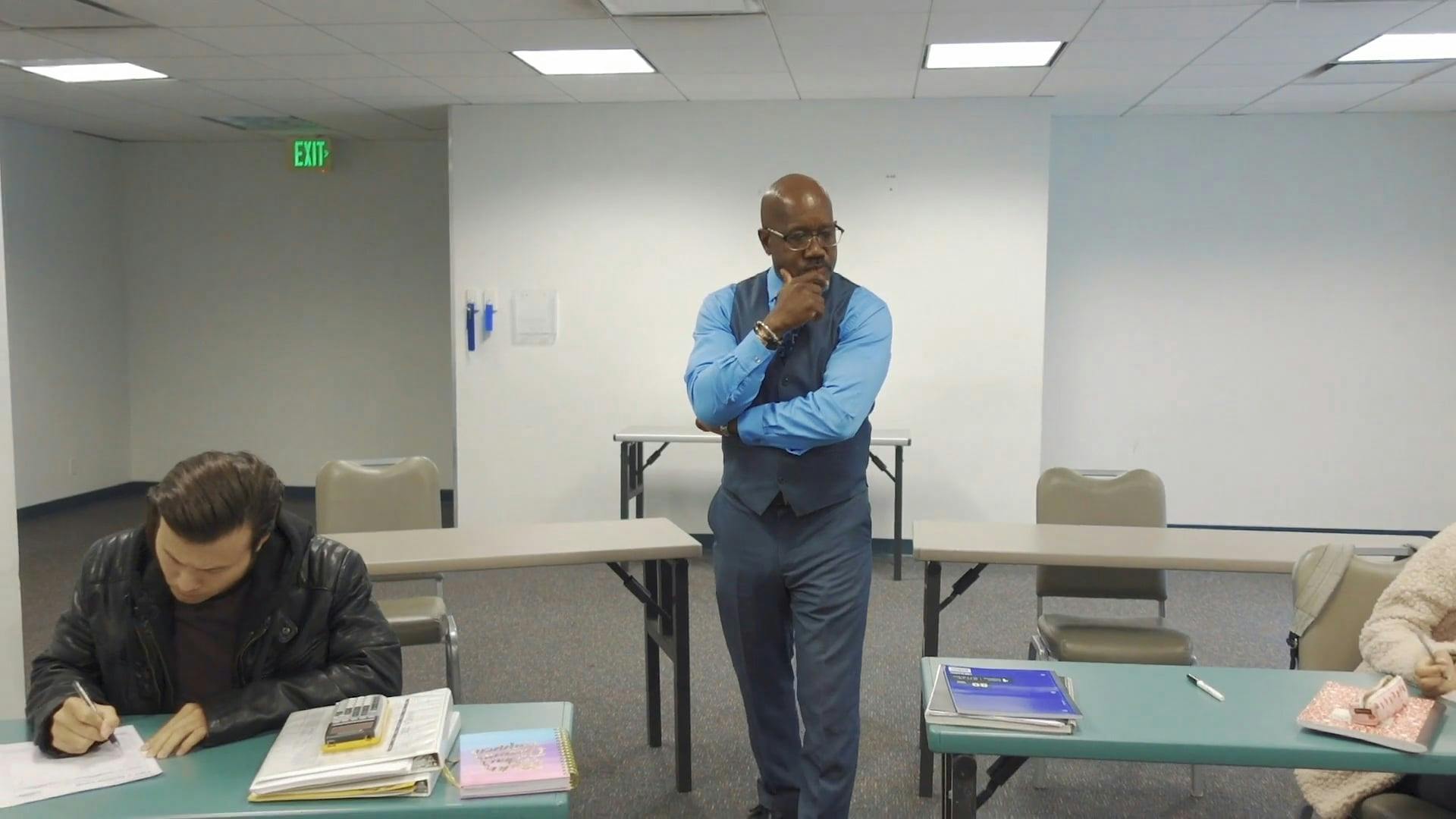 A Teacher Proctoring His Students During an Exam · Free Stock Video