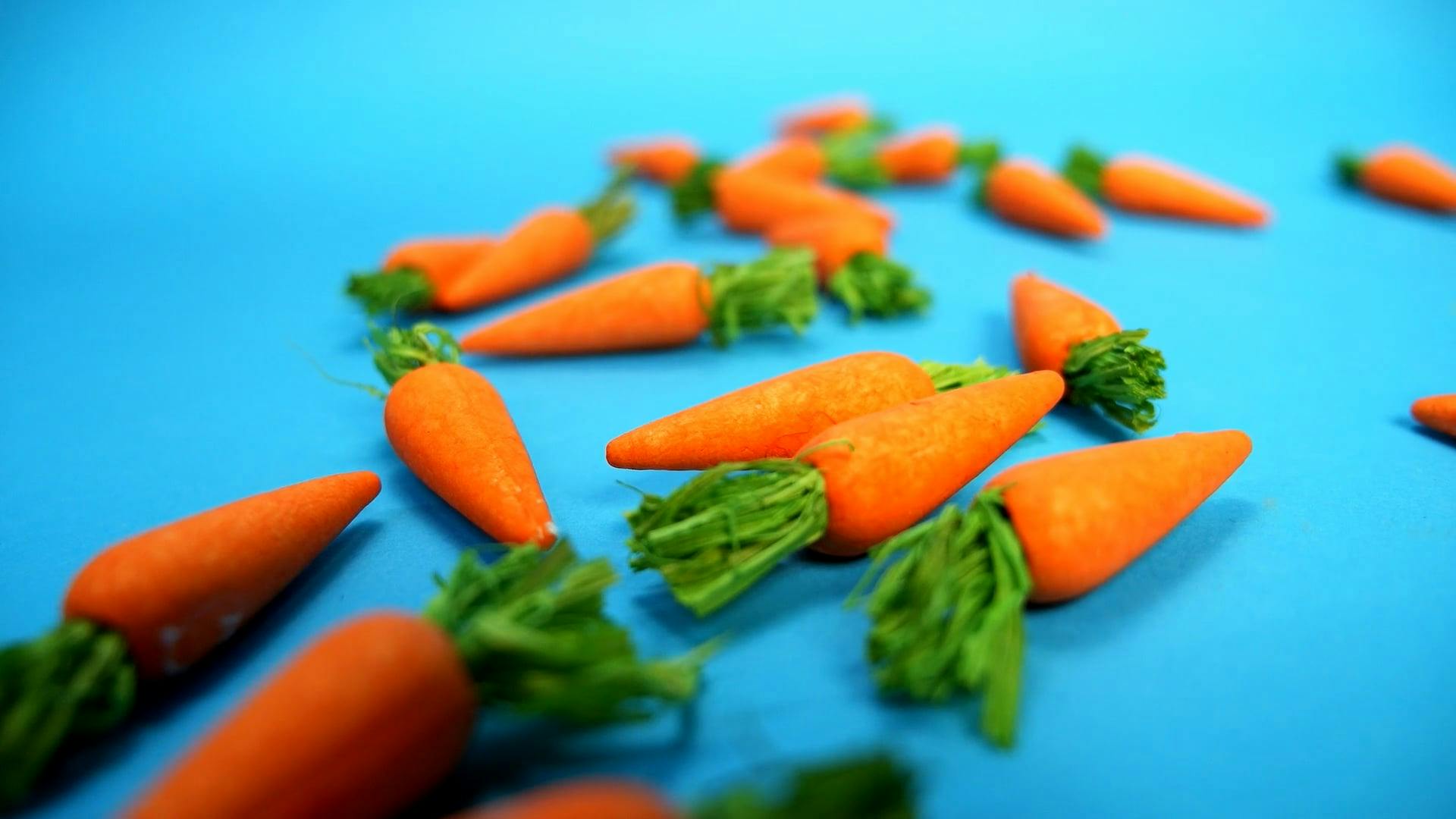 Mini Carrots on a Blue Background Free Stock Video Footage, Royalty ...