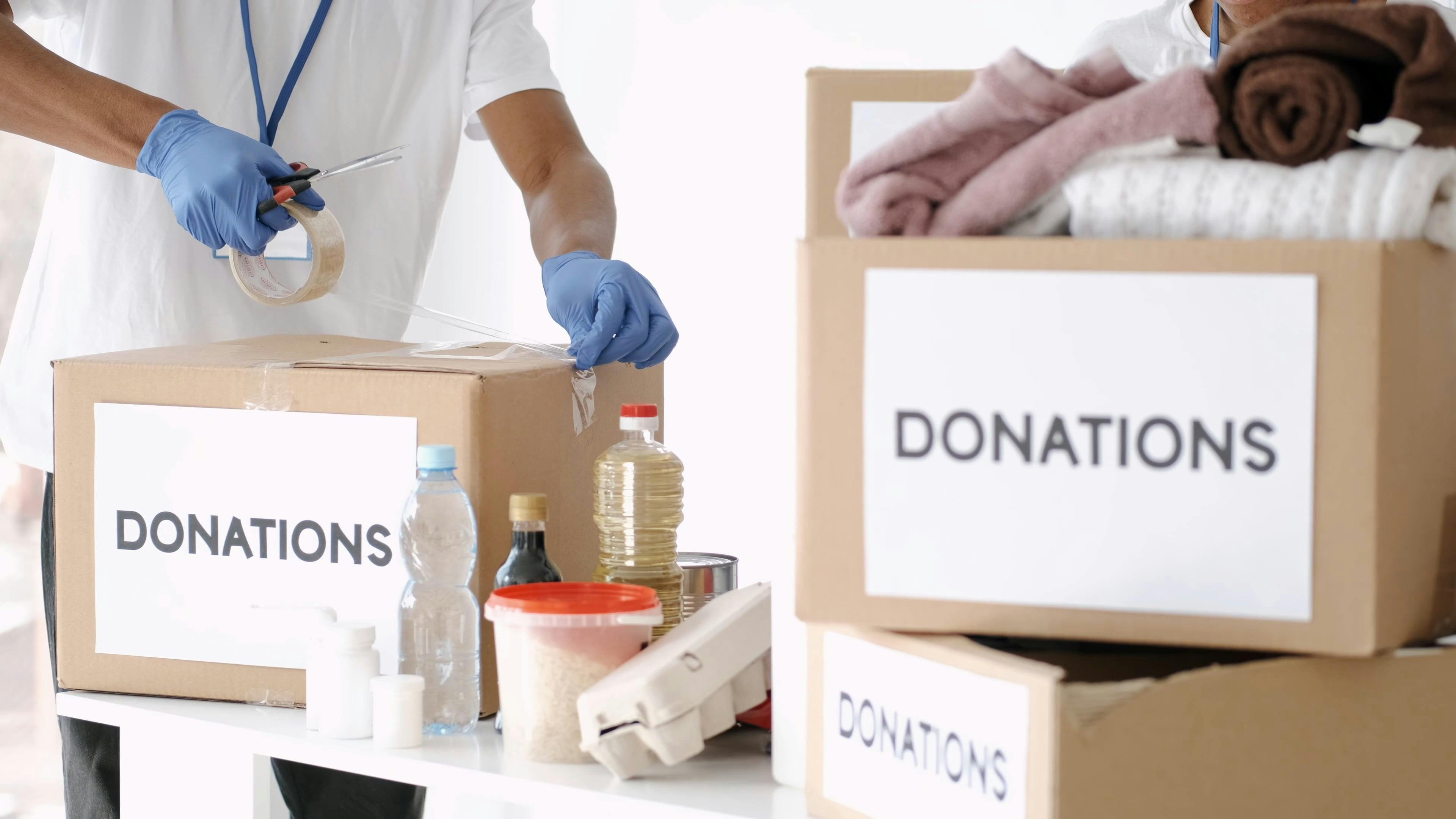 Packing Boxes of Donations on the Table Free Stock Video Footage ...