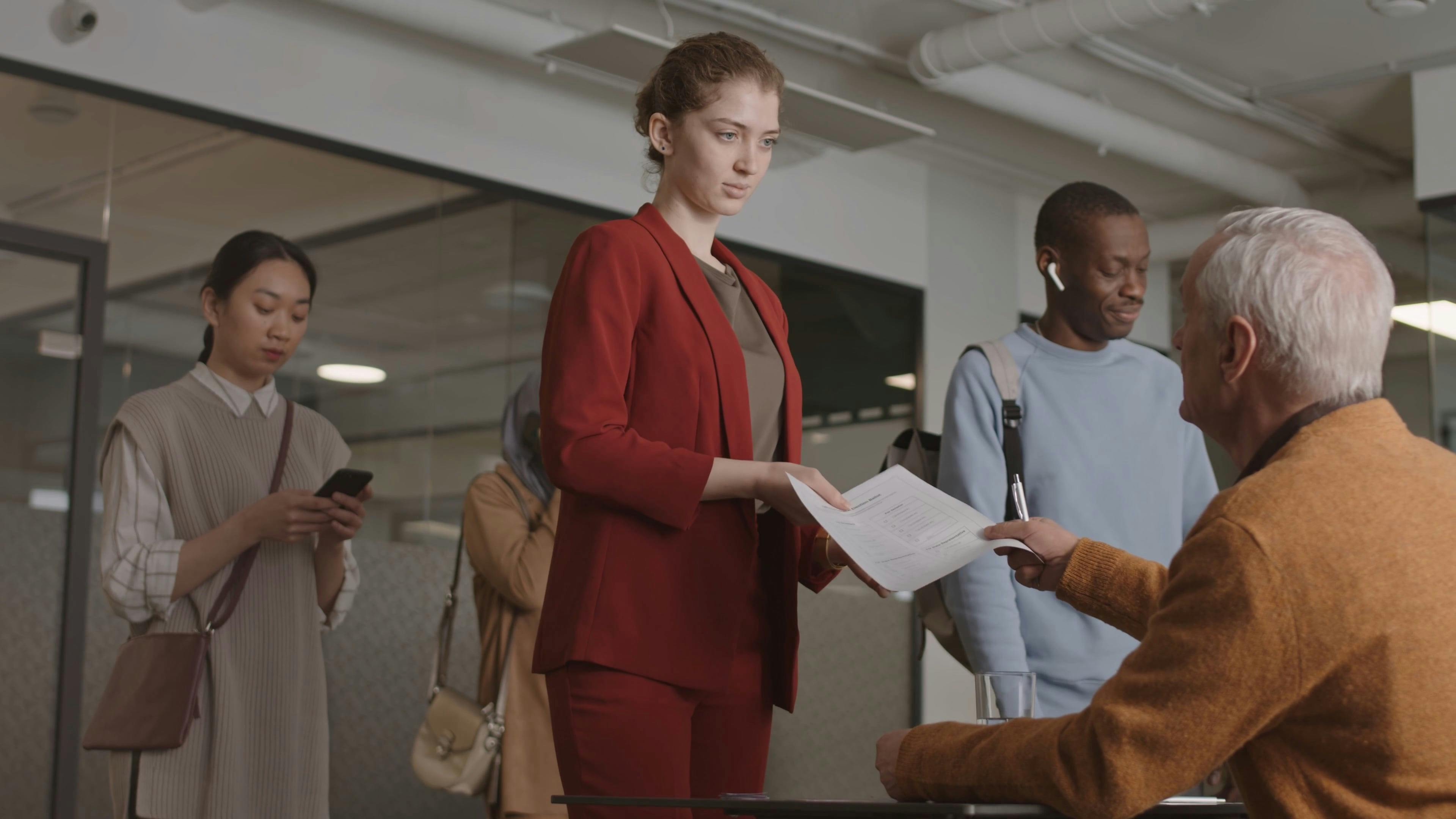 A Man Giving out Forms to People Free Stock Video Footage, Royalty-Free ...