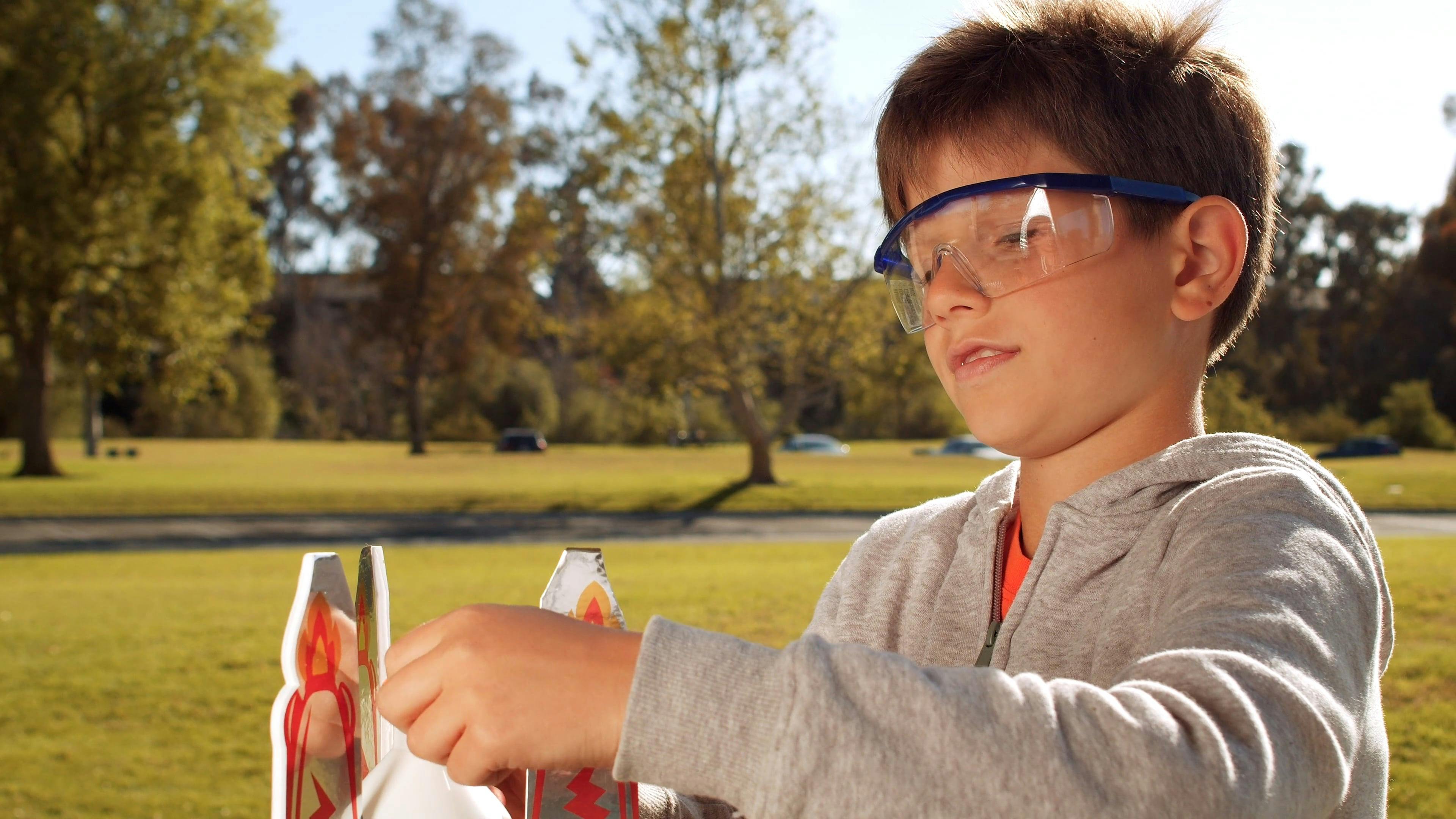 A Boy Building a Spaceship Toy · Free Stock Video