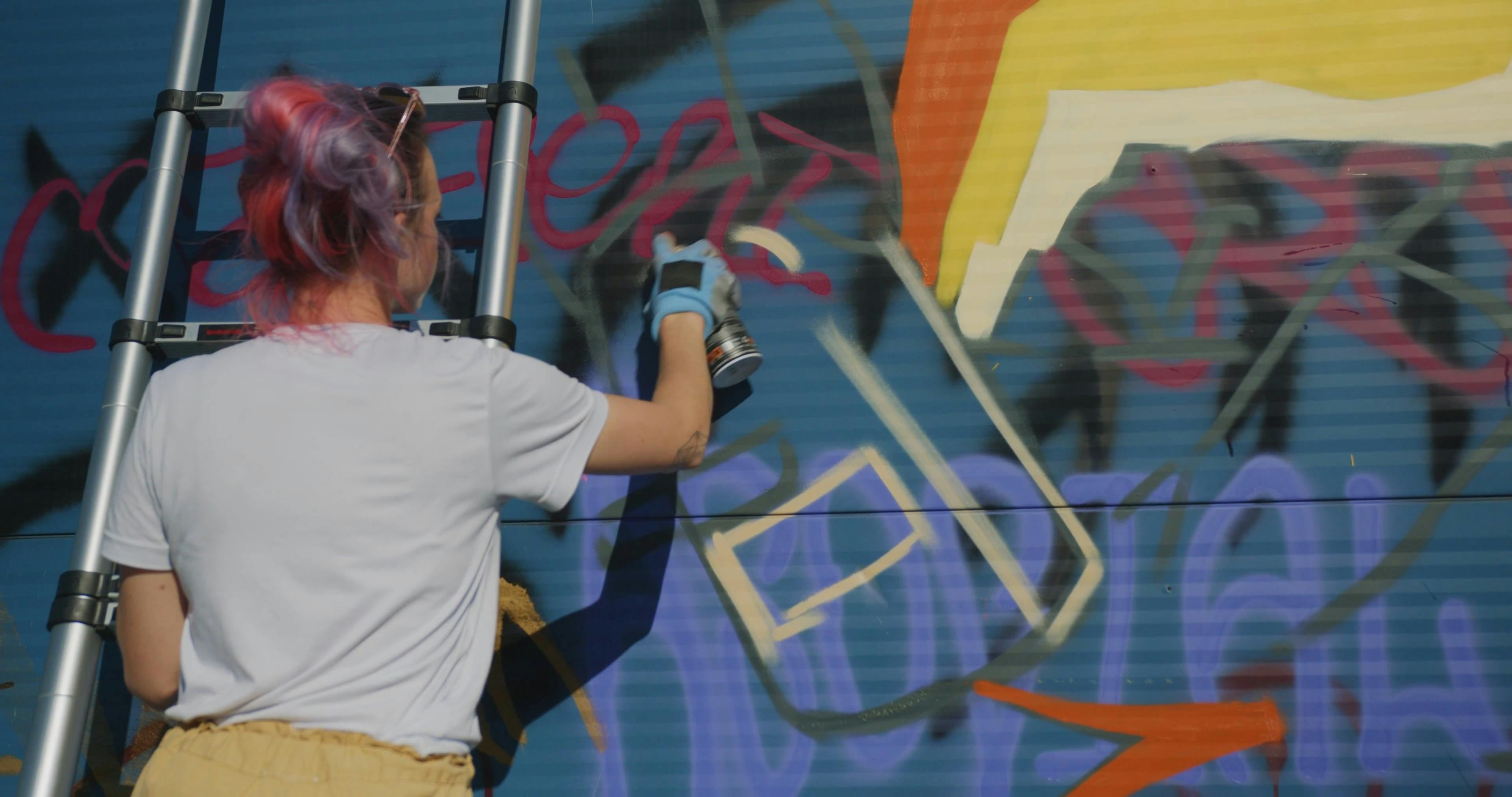 A Woman Spray Painting Free Stock Video Footage, Royalty-Free 4K & HD ...
