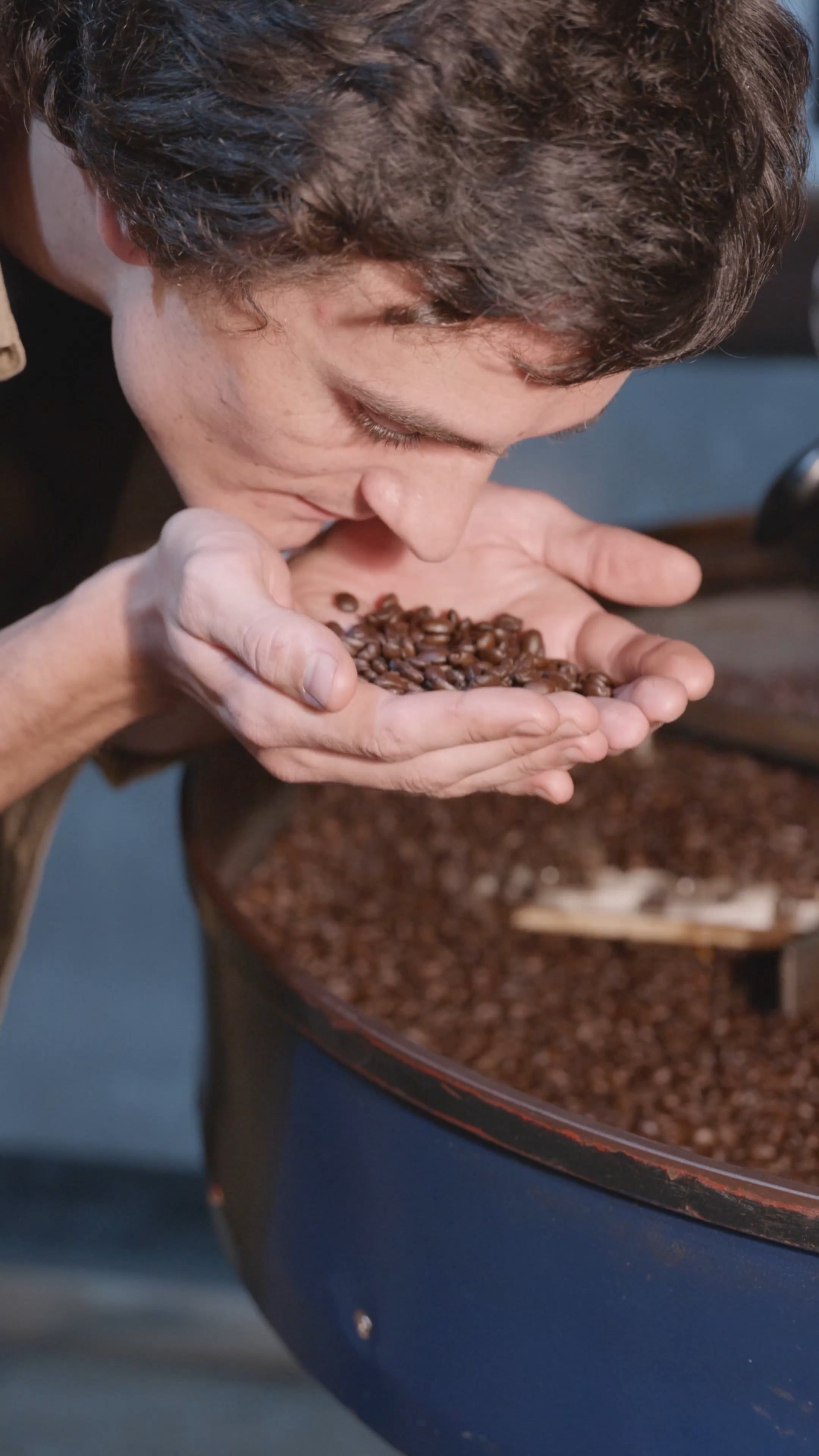 A Man Smelling the Aroma of Roasted Coffee Beans · Free Stock Video
