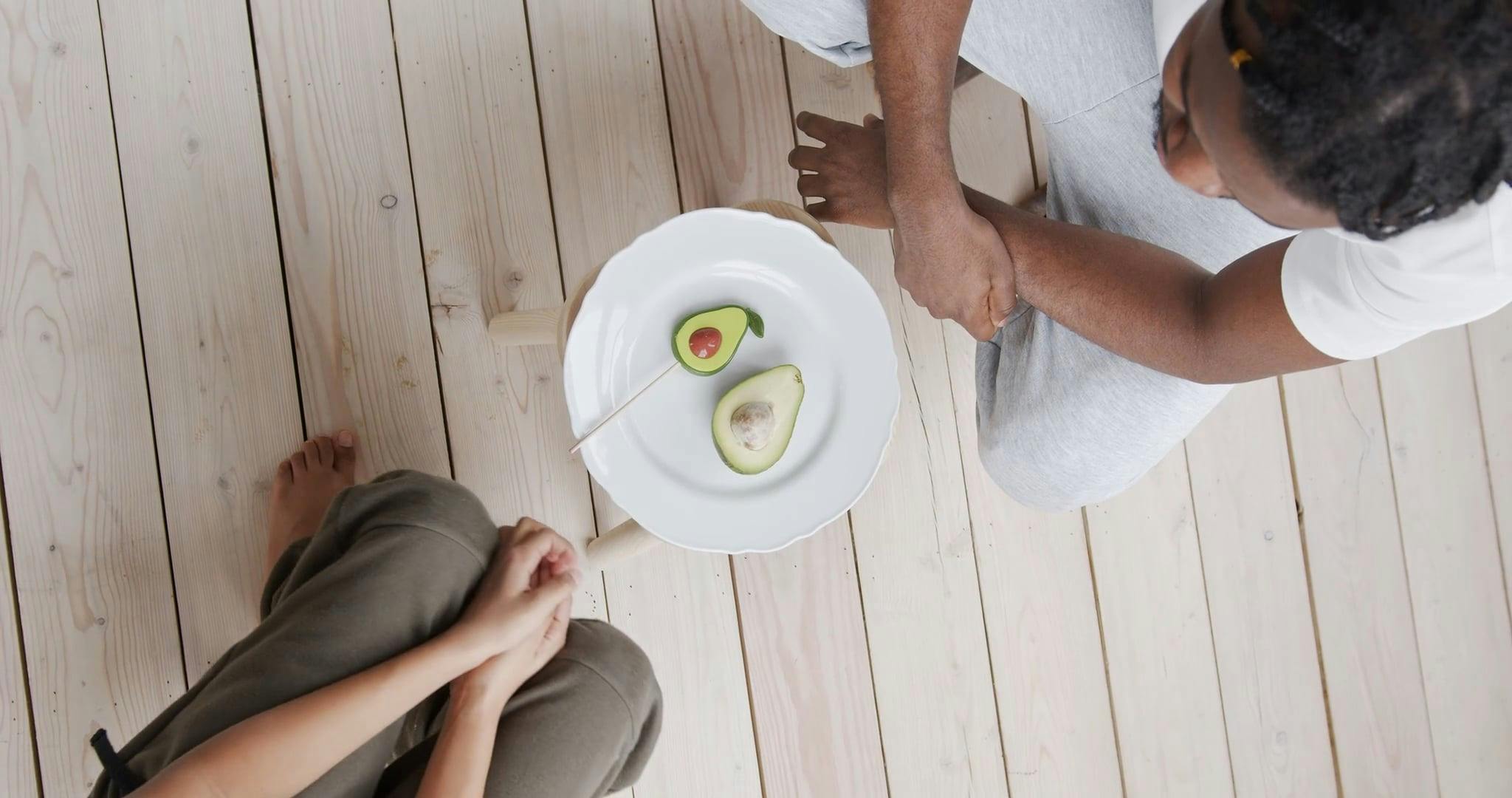 A Person Pointing at Avocados on a Plate Free Stock Video Footage ...
